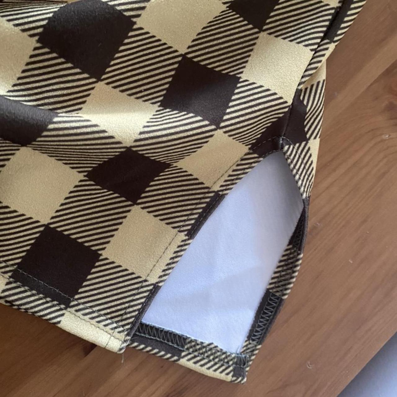 Checkered yellow and black skirt Bought for... - Depop
