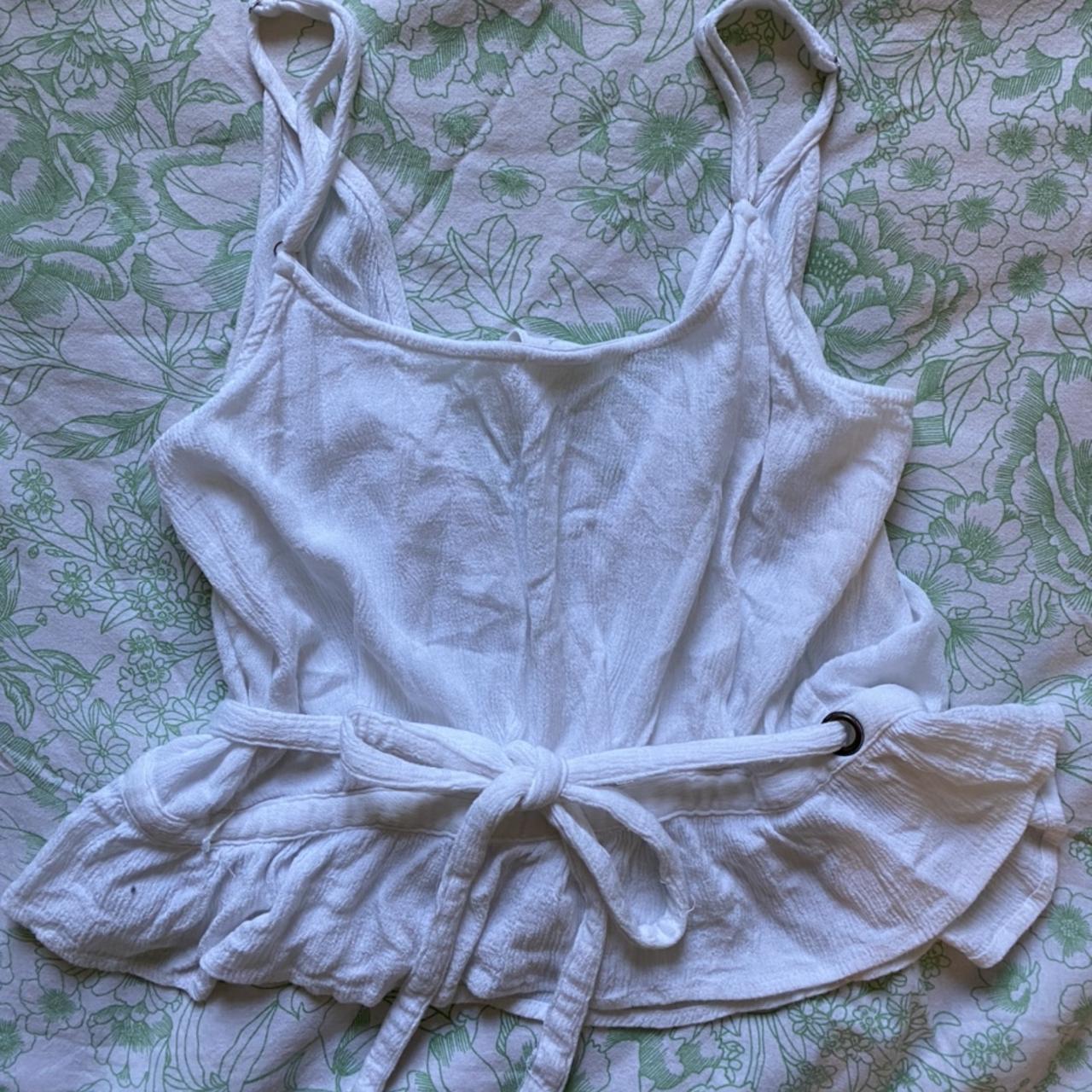 White wrap around crop top would fit size 6-10... - Depop
