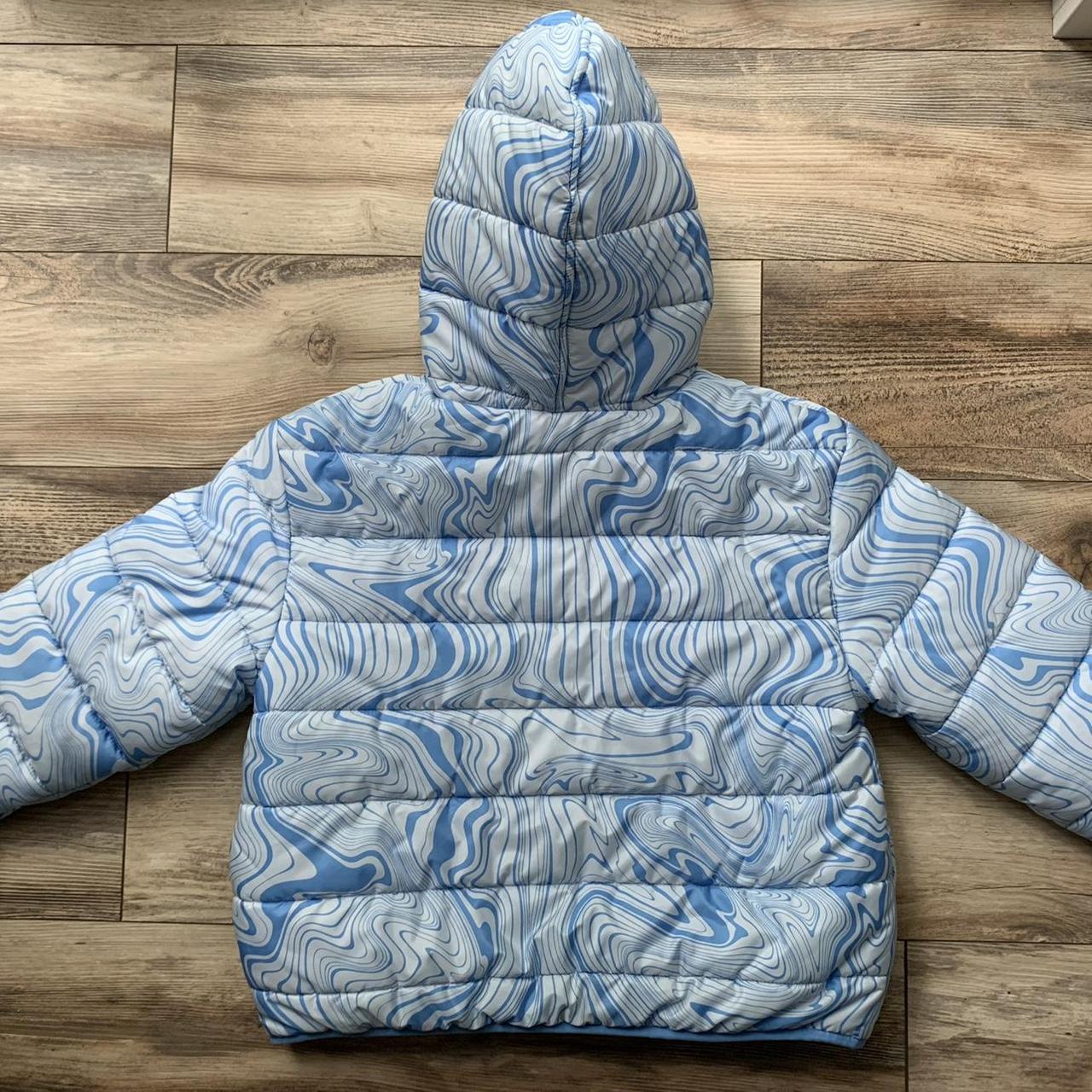 blue marble swirl puffer jacket. long sleeve hooded... - Depop