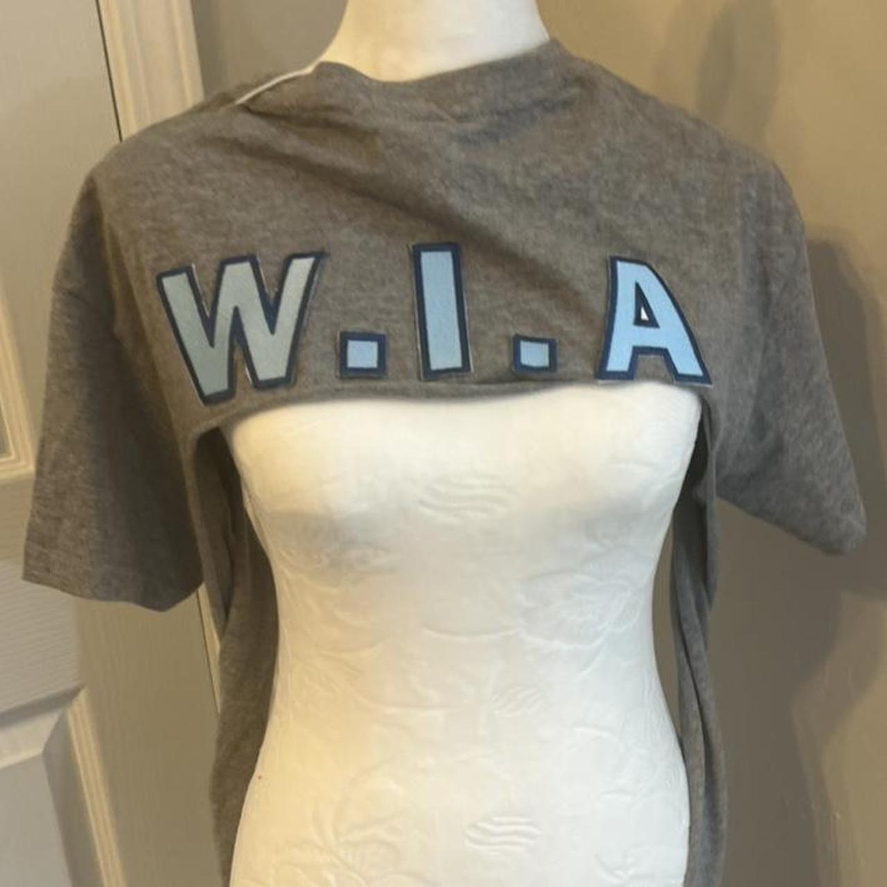 W.I.A cut out tee Rare wia Selling the bra a as... - Depop