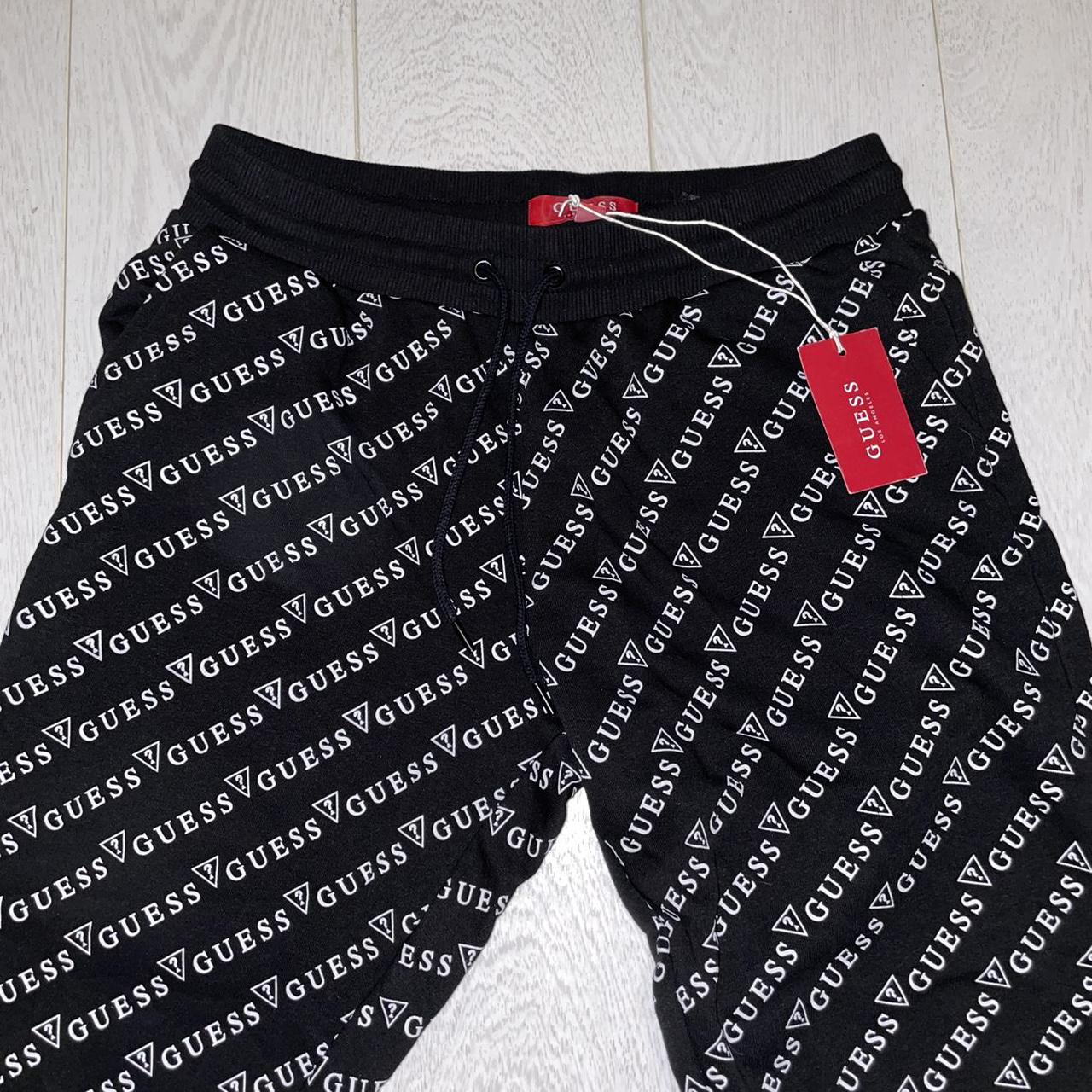 Selling this brand new black GUESS sweatpants with... - Depop