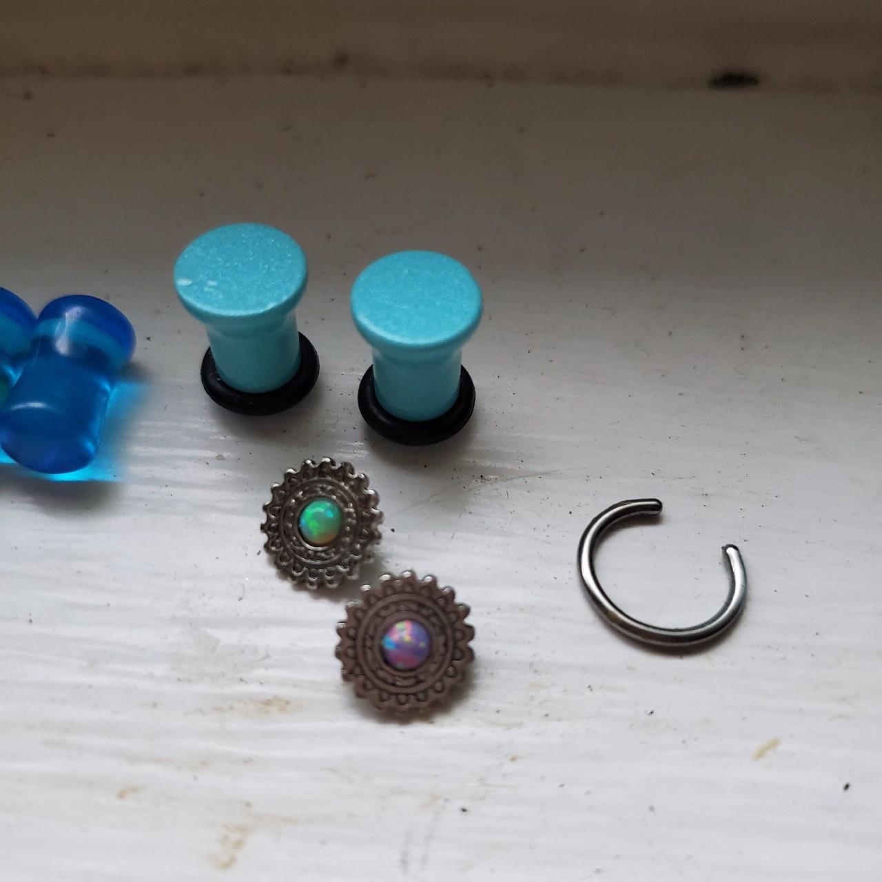 cleaning out my body jewelry. If you see anything... - Depop