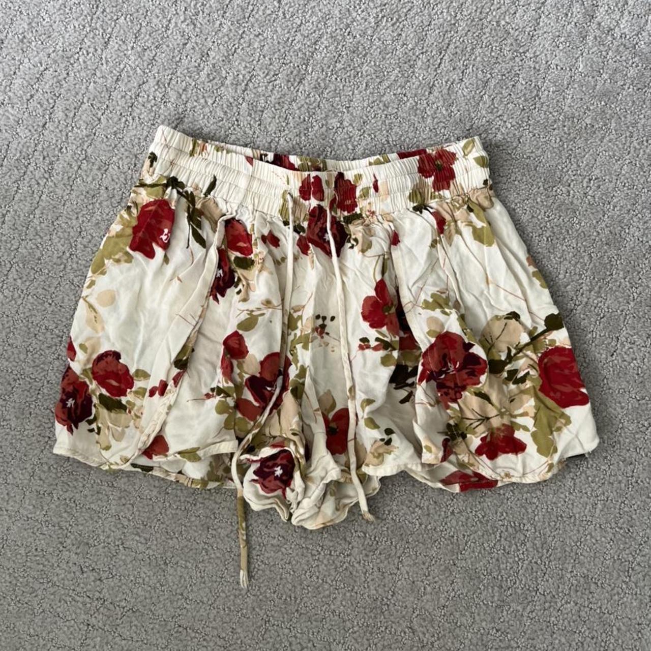 flowy floral booty shorts. marked S but a bit more... - Depop