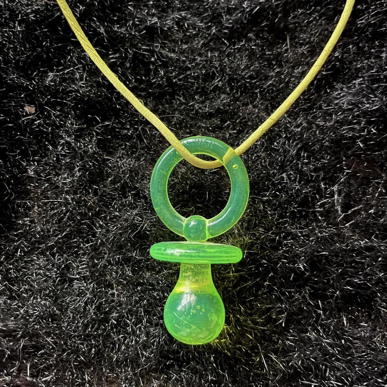 Vintage plastic neon yellow-green pacifier pendant... - Depop