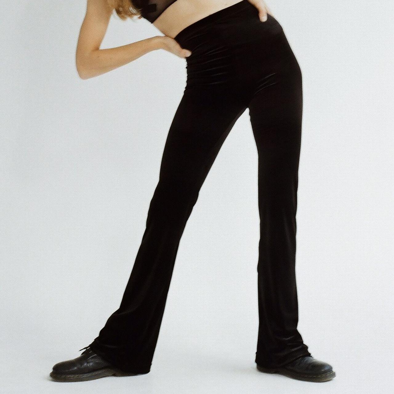 Sample pair of black flares with flower embossing... - Depop