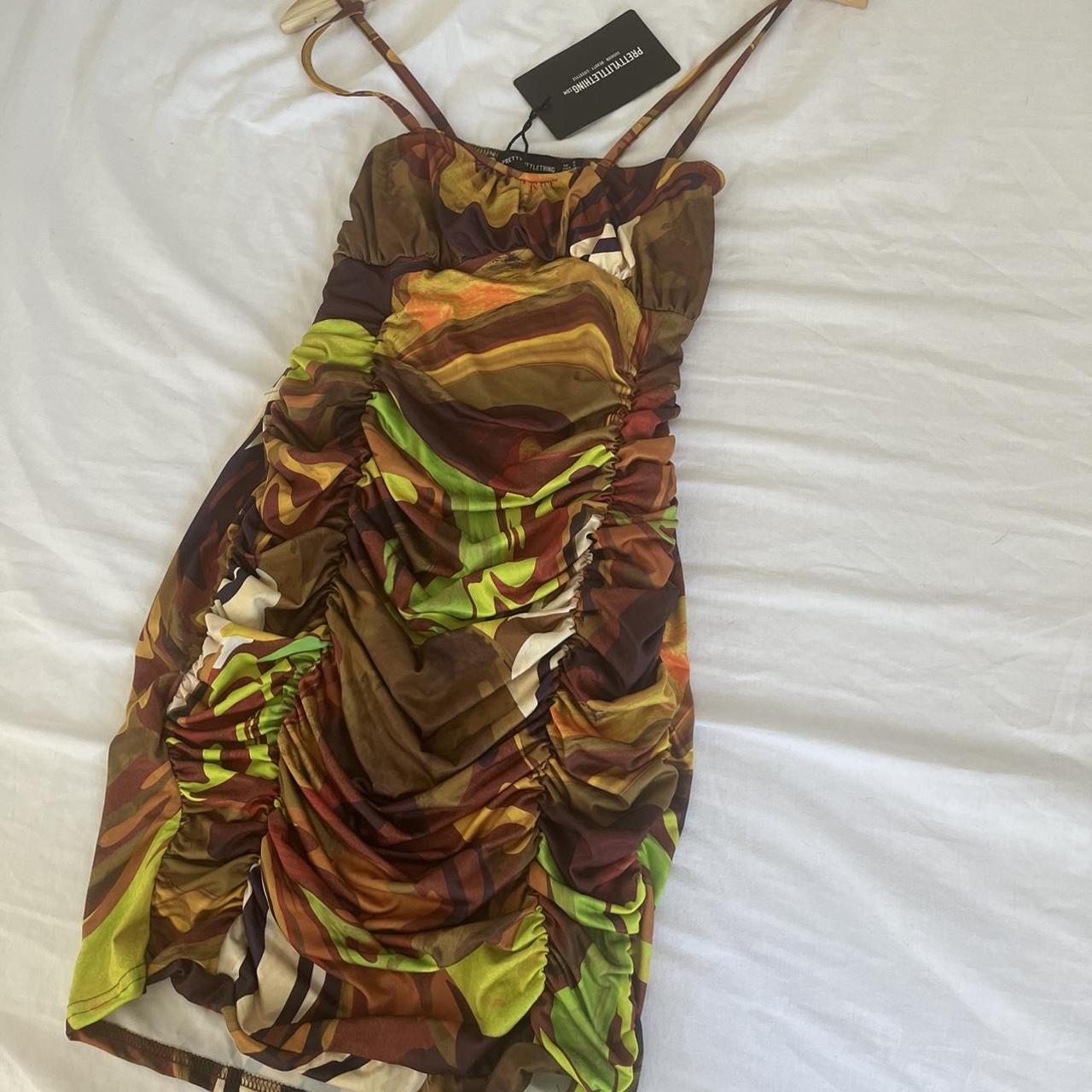 Pretty little thing shape brown marble slinky... - Depop