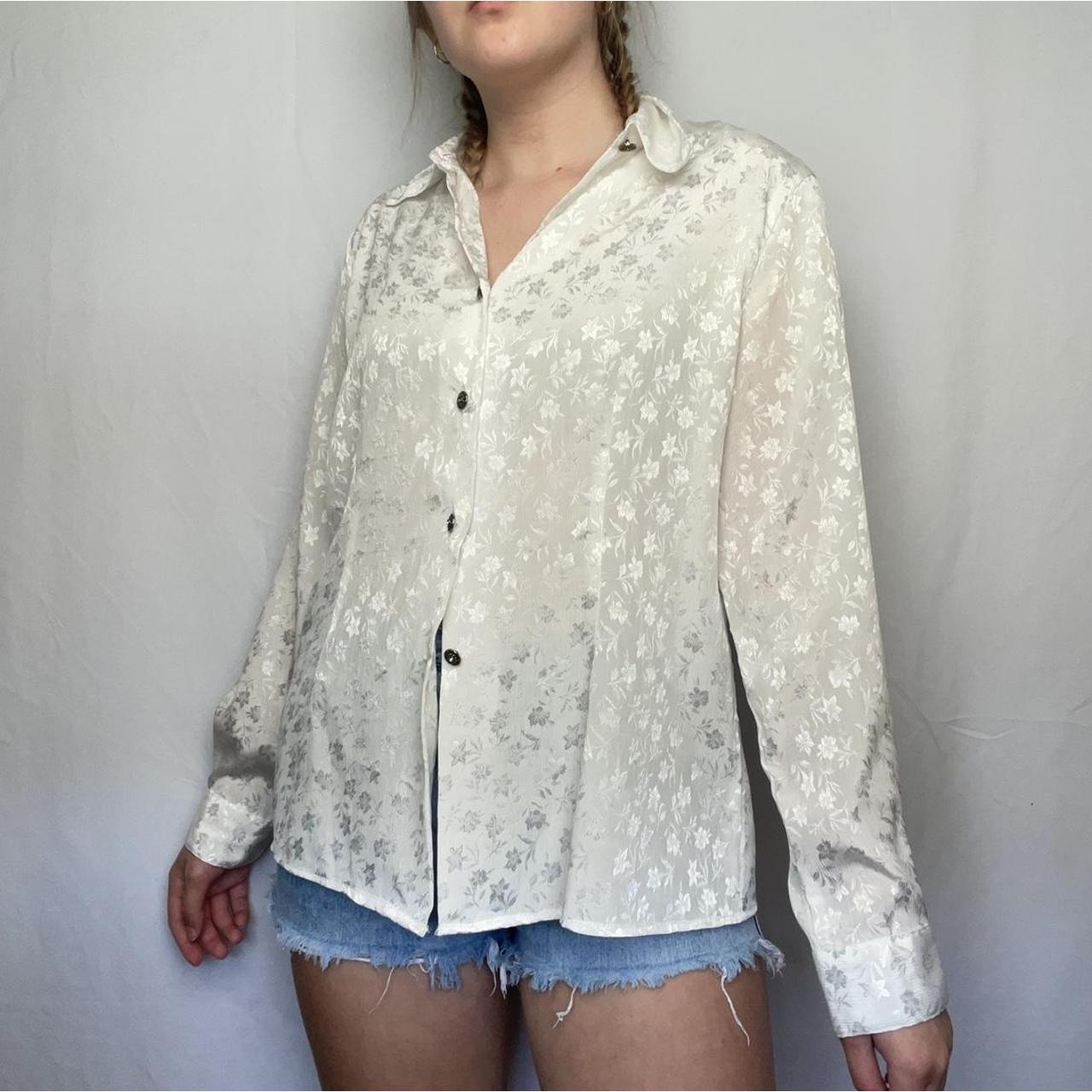 super cool silky white button down blouse. by the... - Depop
