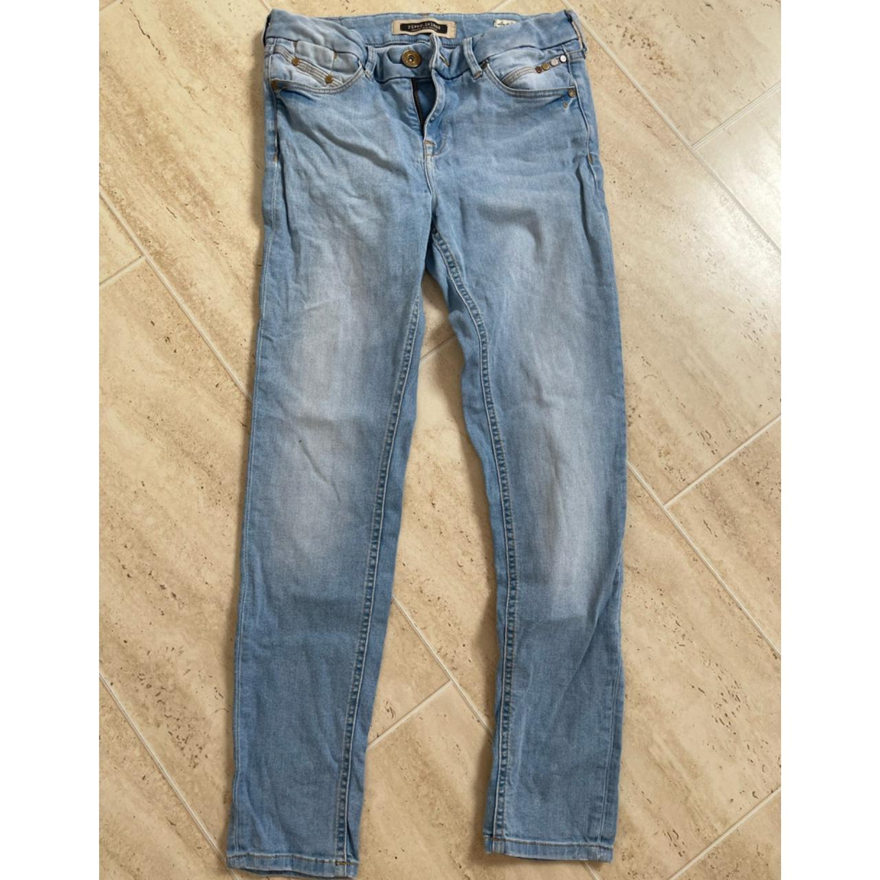 Light blue washed out skinny denim jeans from river... - Depop