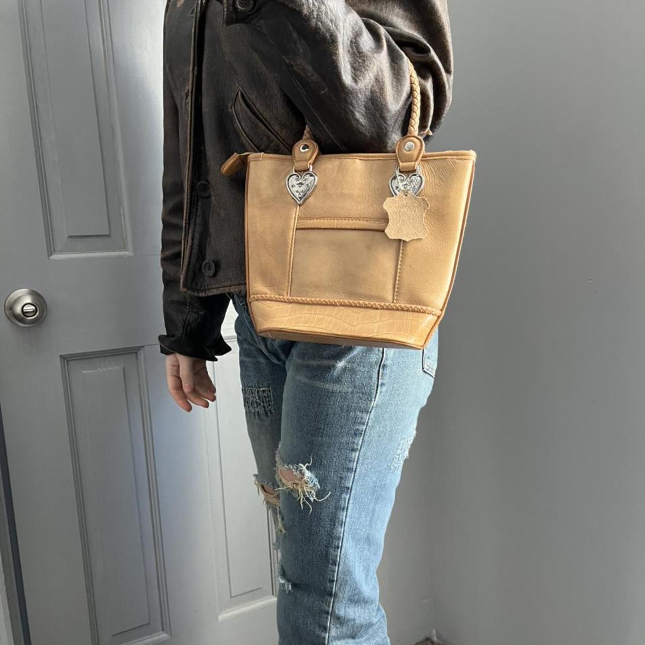 the cutest vintage tan mini bag with silver heart... - Depop