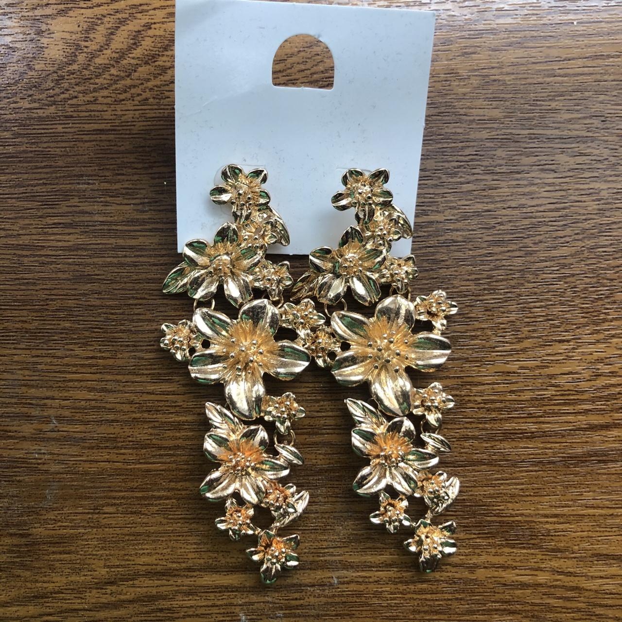 Gold flower dangling earrings from boohoo. Never... - Depop