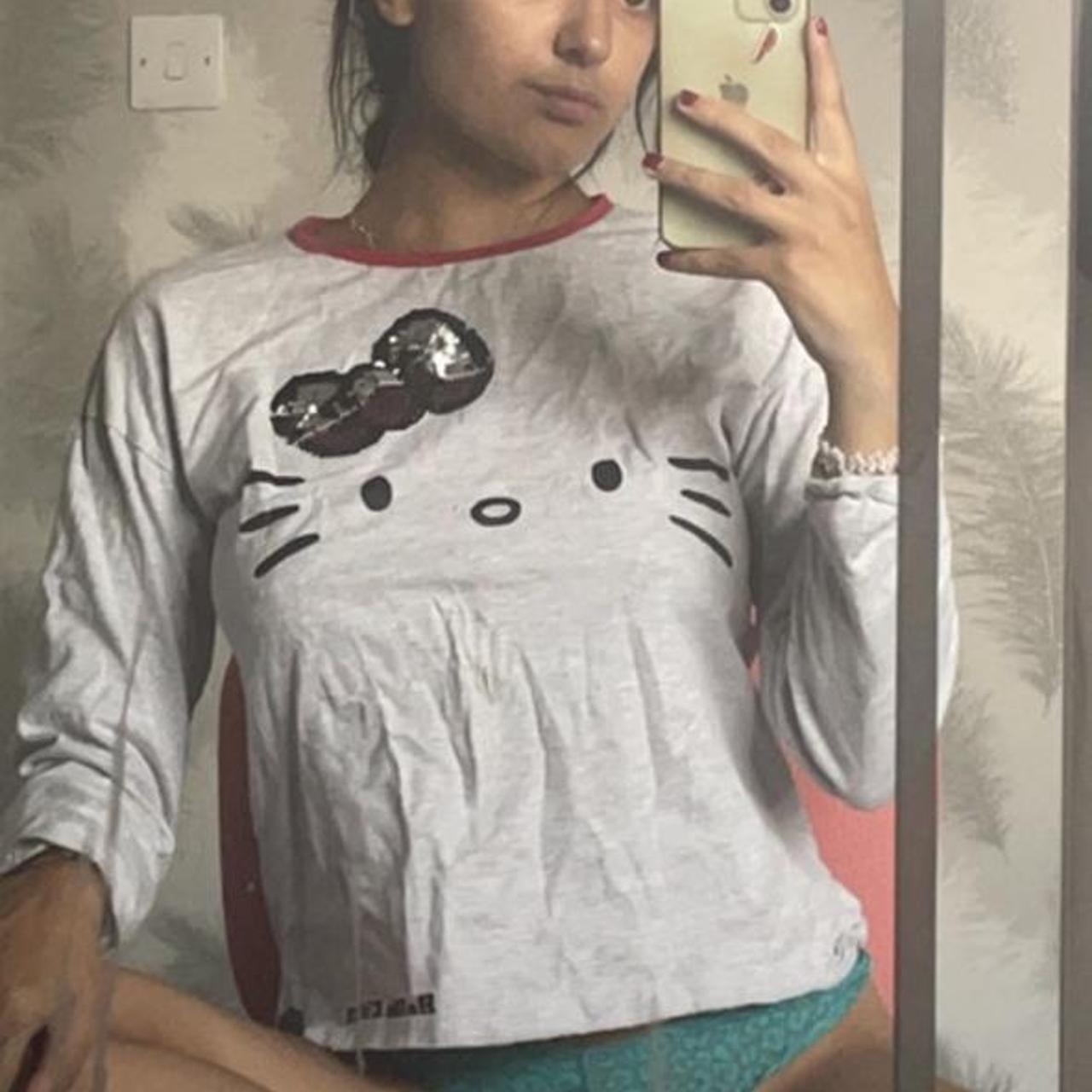 Hello kitty top so cute been worn not sure of size... - Depop