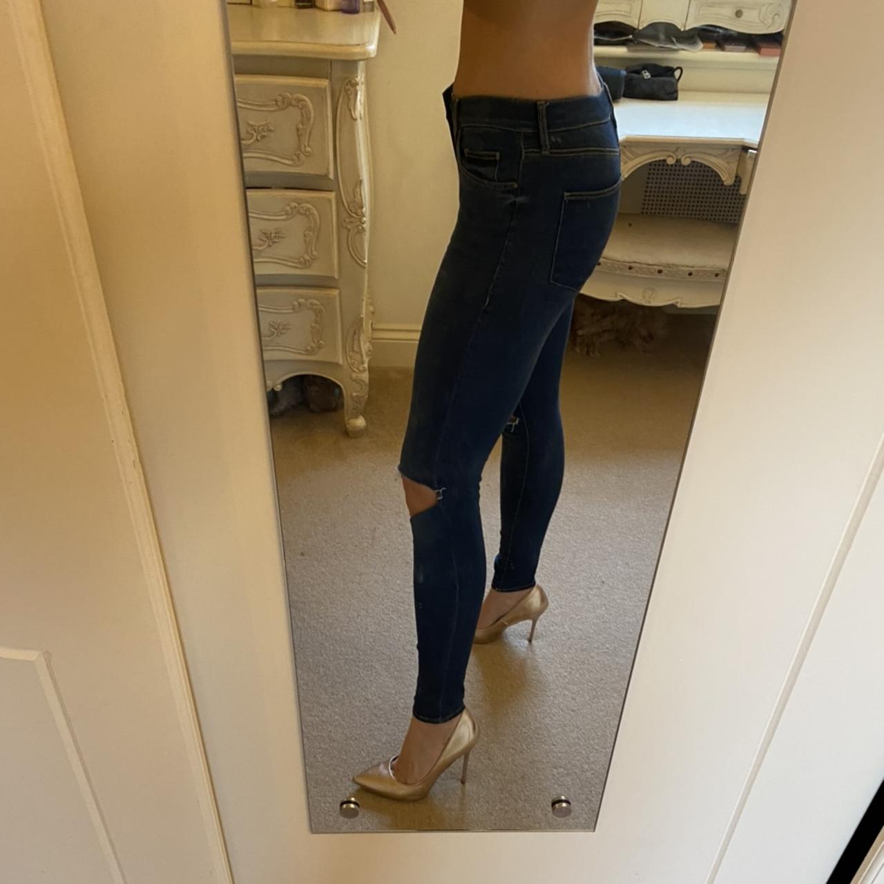 Topshop Leigh jeans with ripped knees Size W28 leg... - Depop