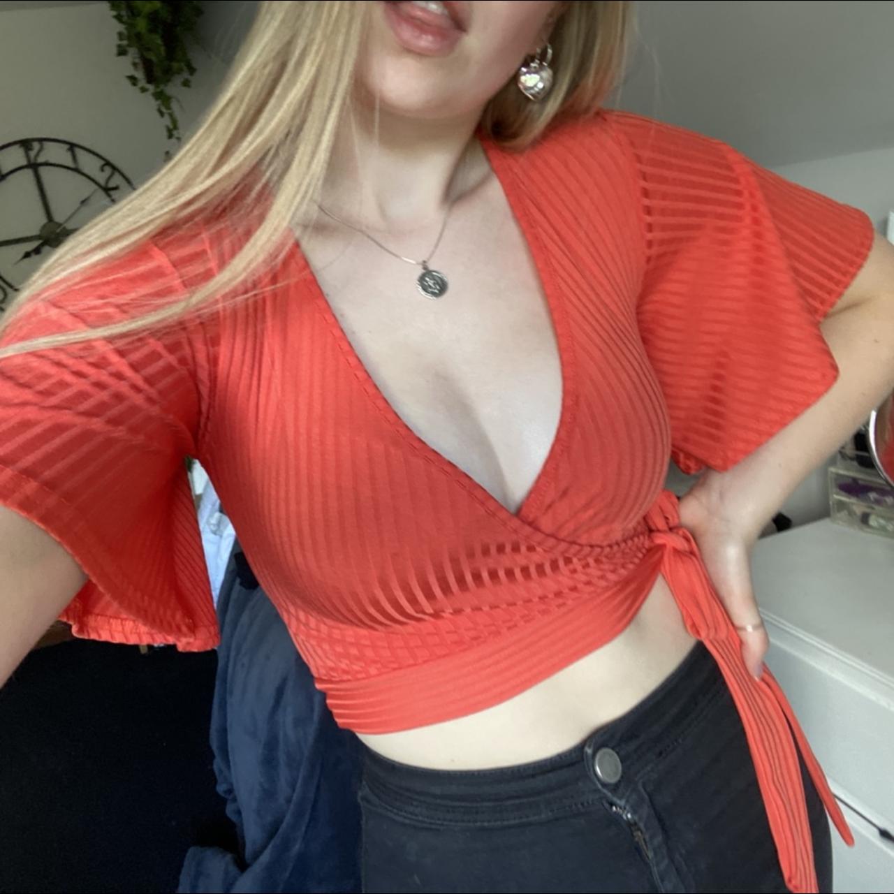 Super cute bright orange wrap top In almost perfect... - Depop