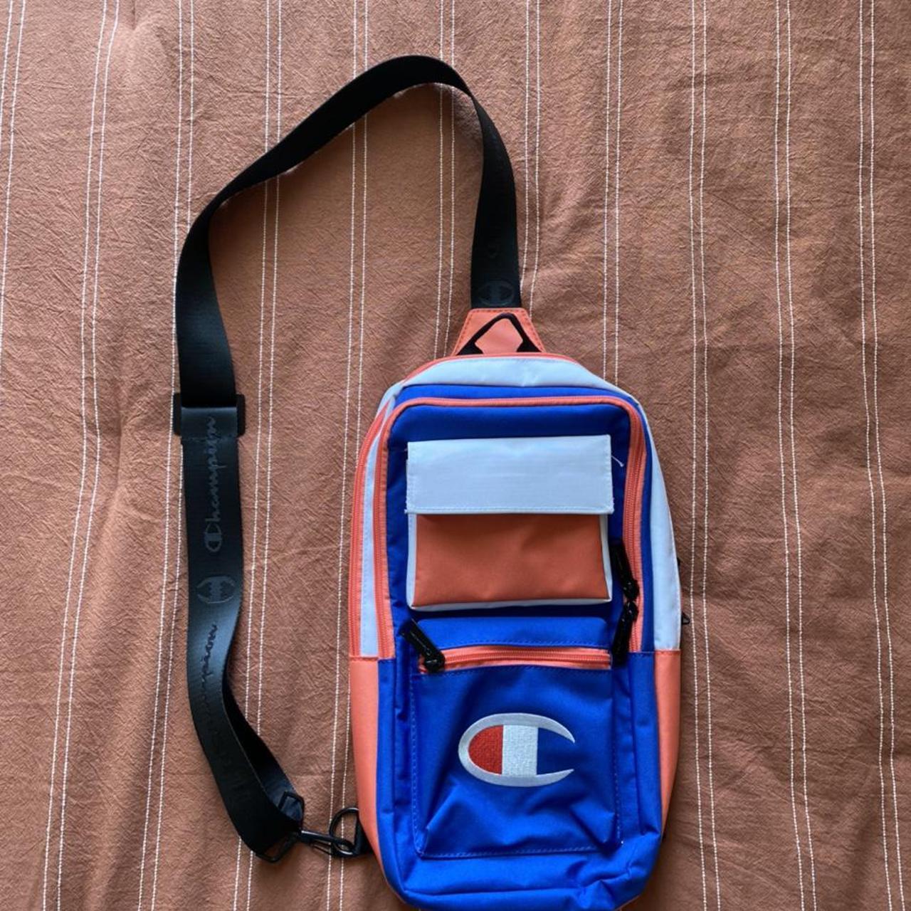 Bright champion sling side bag in a blue, salmon,... - Depop