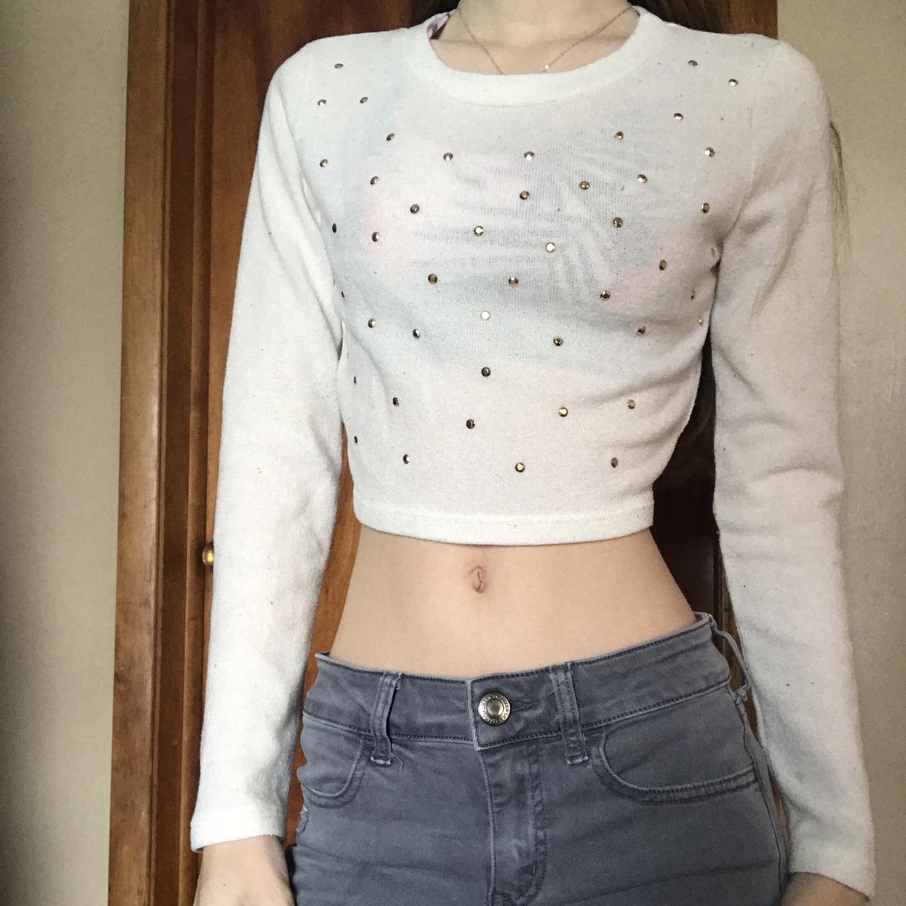 white cropped long sleeve sweater from delia*s with... - Depop