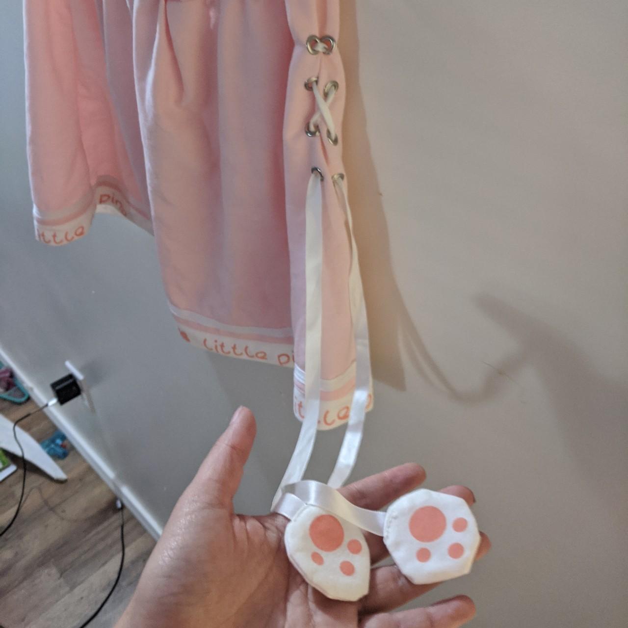 pastel pink miniskirt with cute lil paws and... - Depop