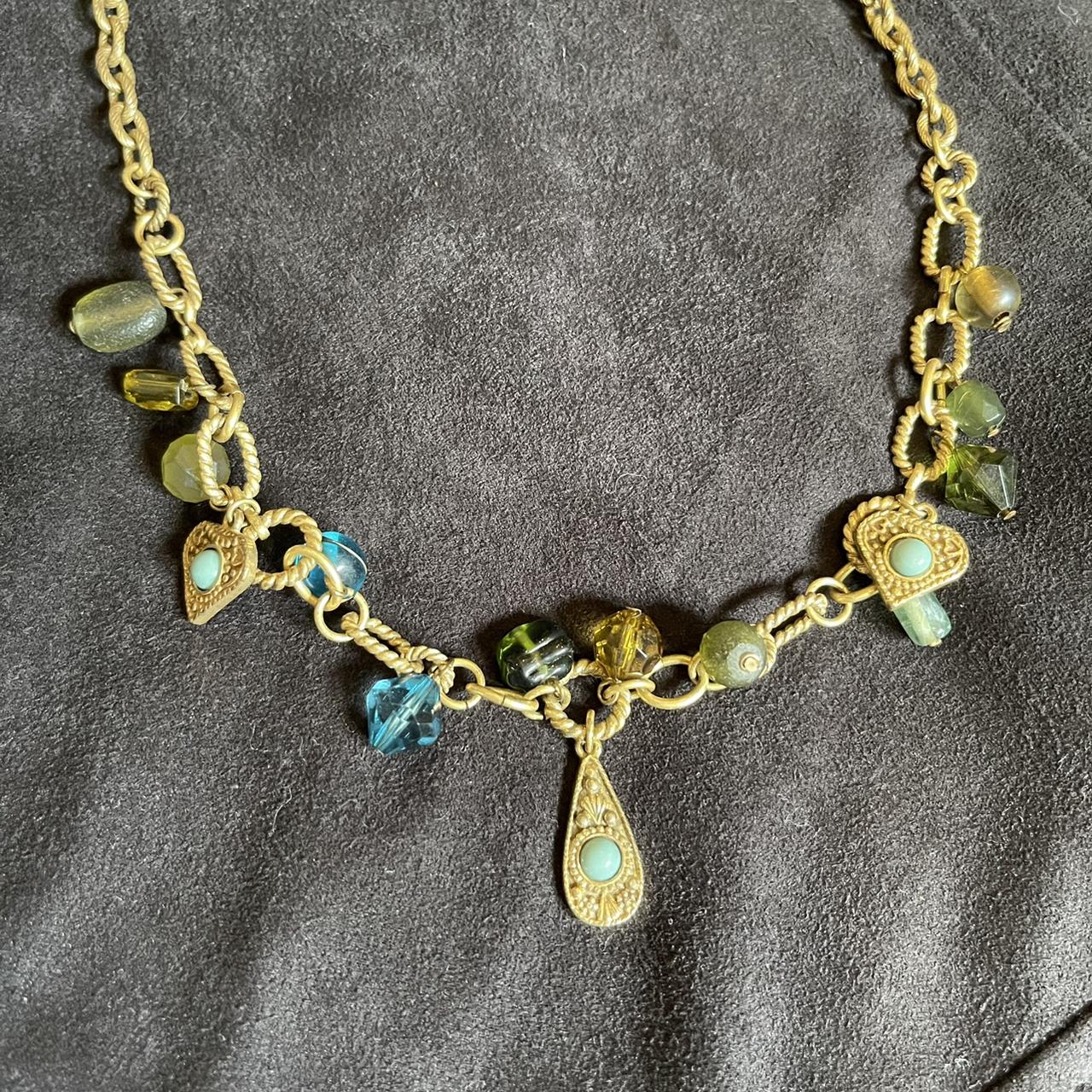 Beautiful aqua and gold look necklace... - Depop