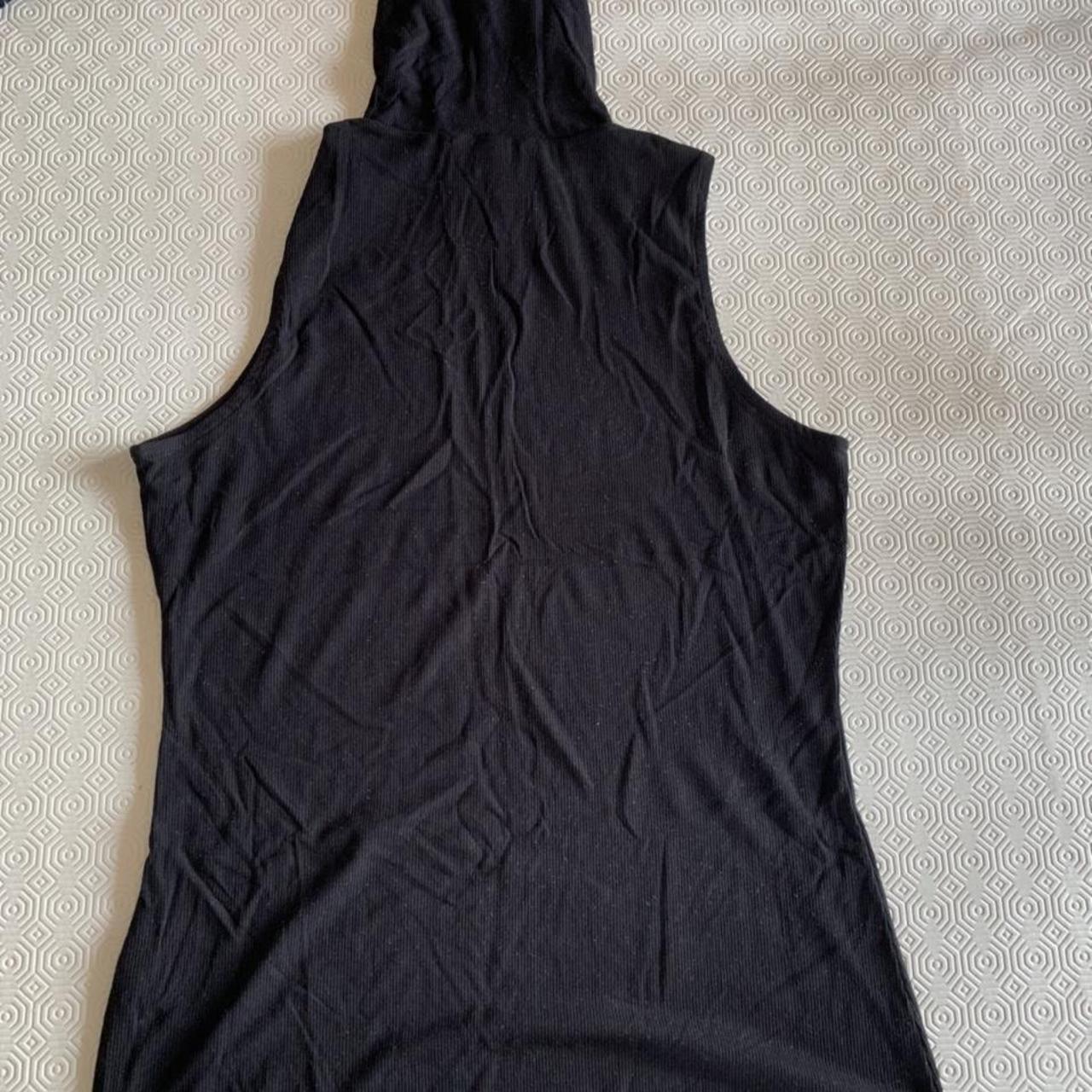Sleeveless turtle neck, thin material. Can be used... - Depop
