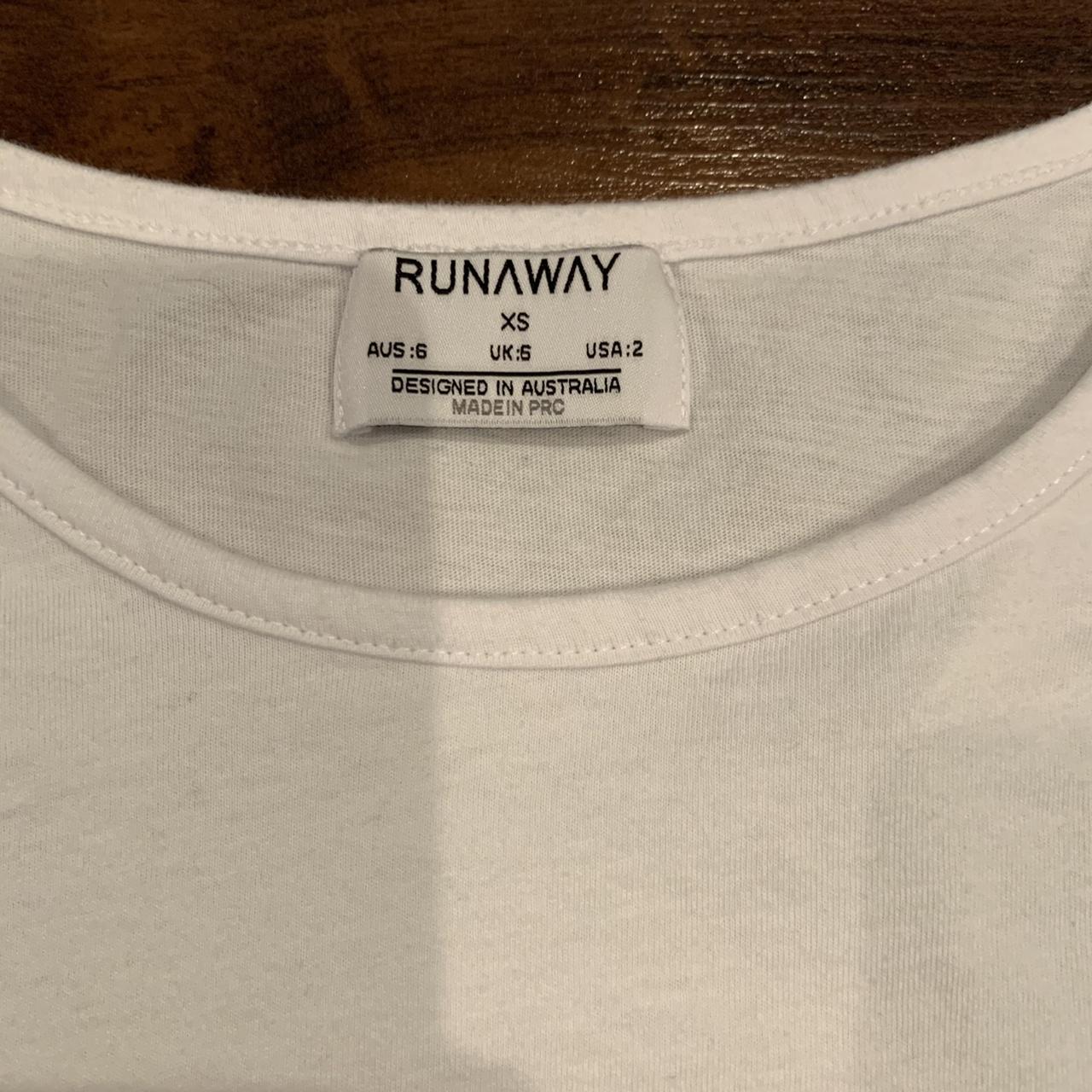 White Runaway The Label Paris tee with folded... - Depop