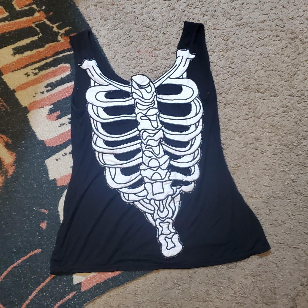 Black ribcage tank Back is just plain black Size... - Depop