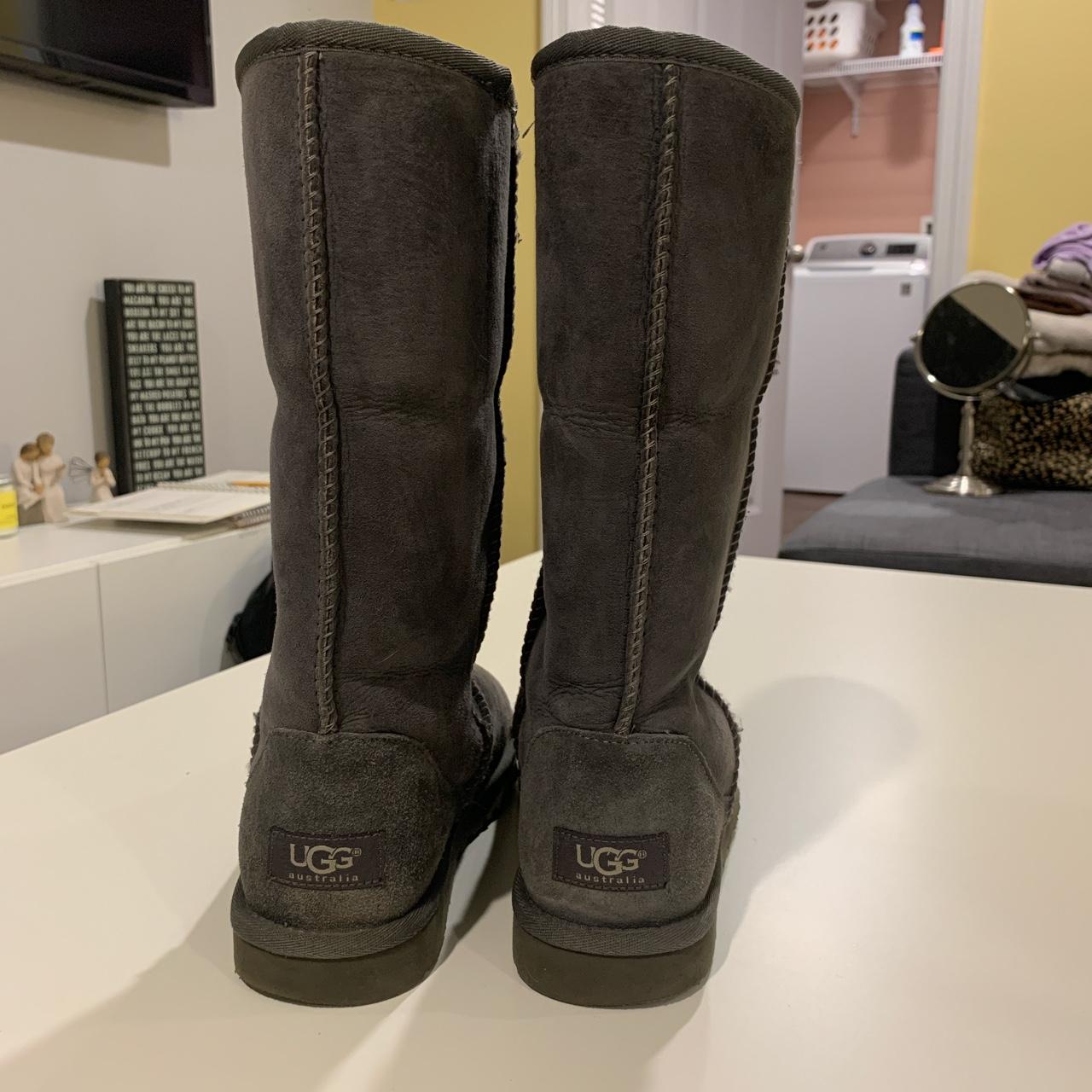 Tall grey uggs. Slight water marks on right shoe but... - Depop