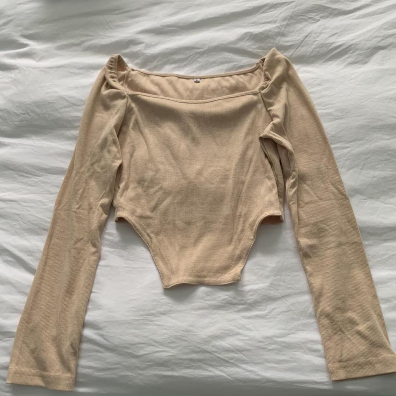 Beige straight line long sleeve top Size small... - Depop
