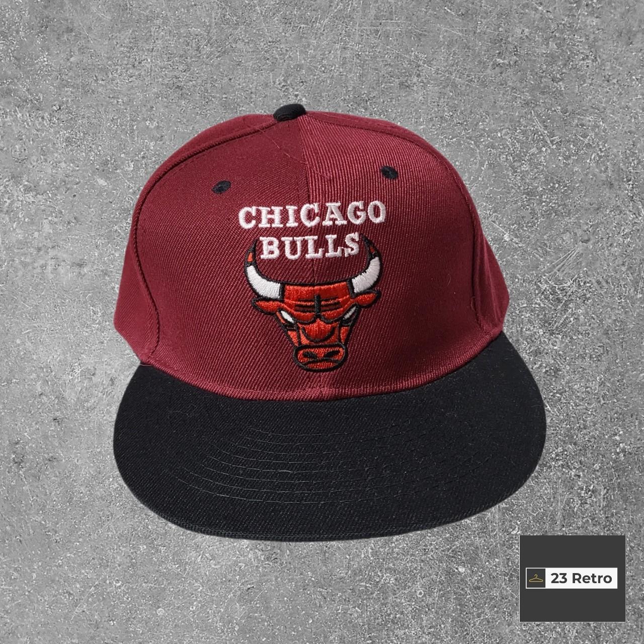 Chicago bulls burgundy and black snap back cap.... - Depop