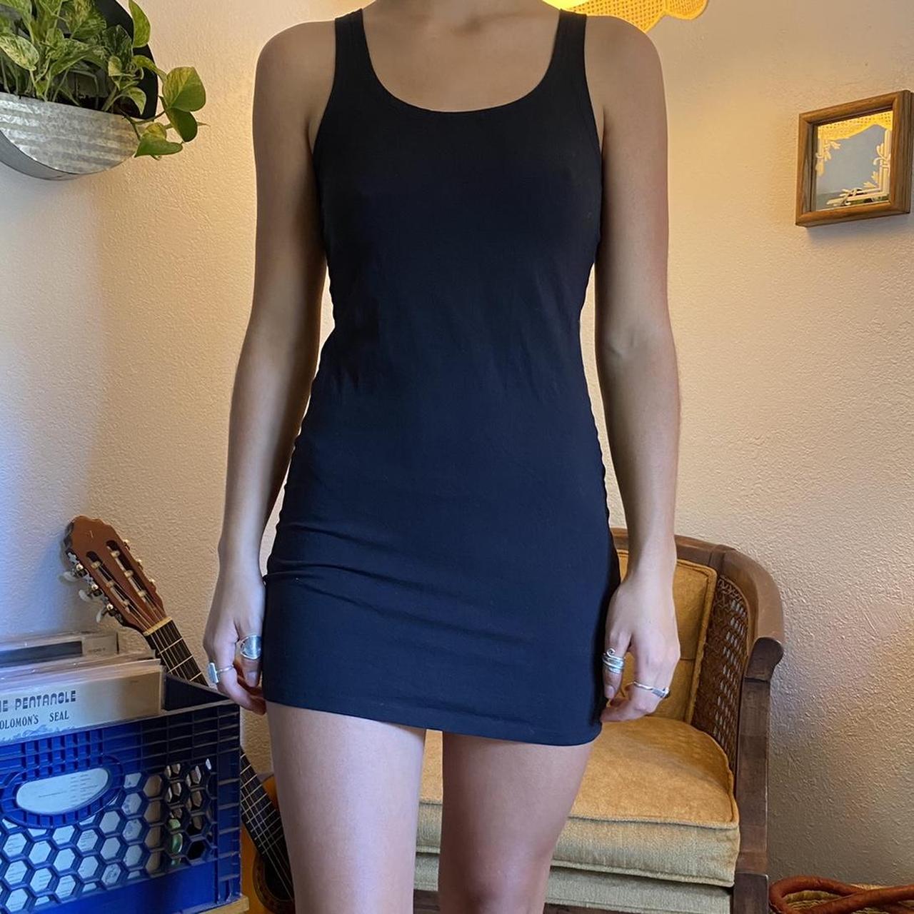 Your basic black body con tank dress. Reminds me of... - Depop