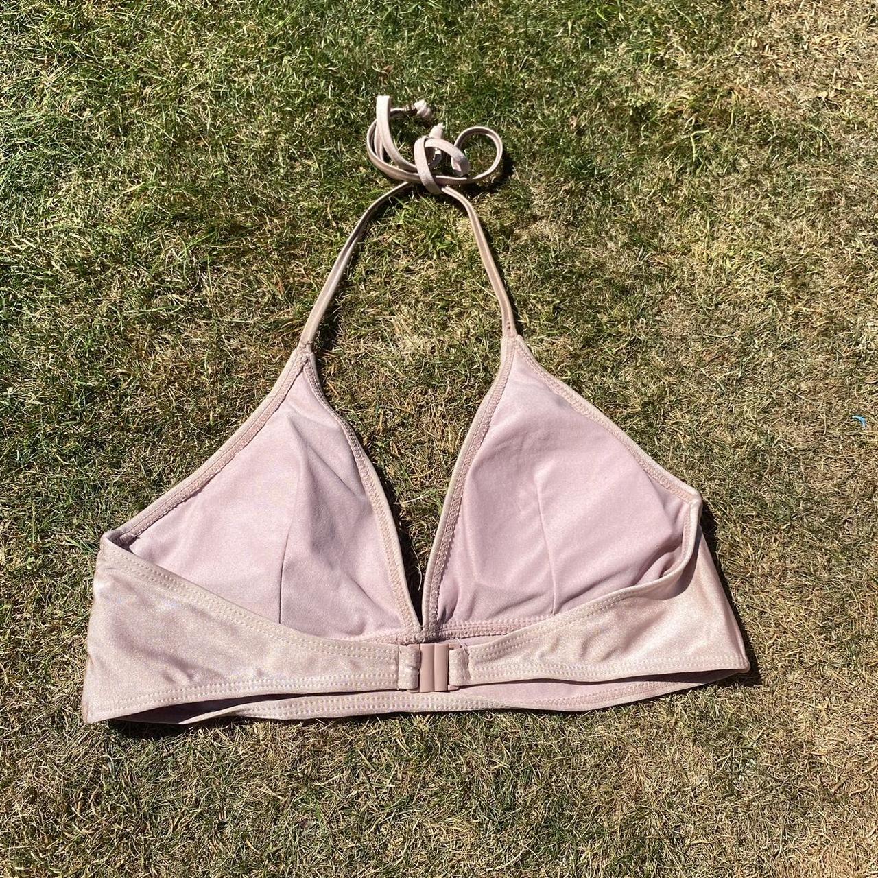Pink bikini top with halter neck tie and a clasp at... - Depop