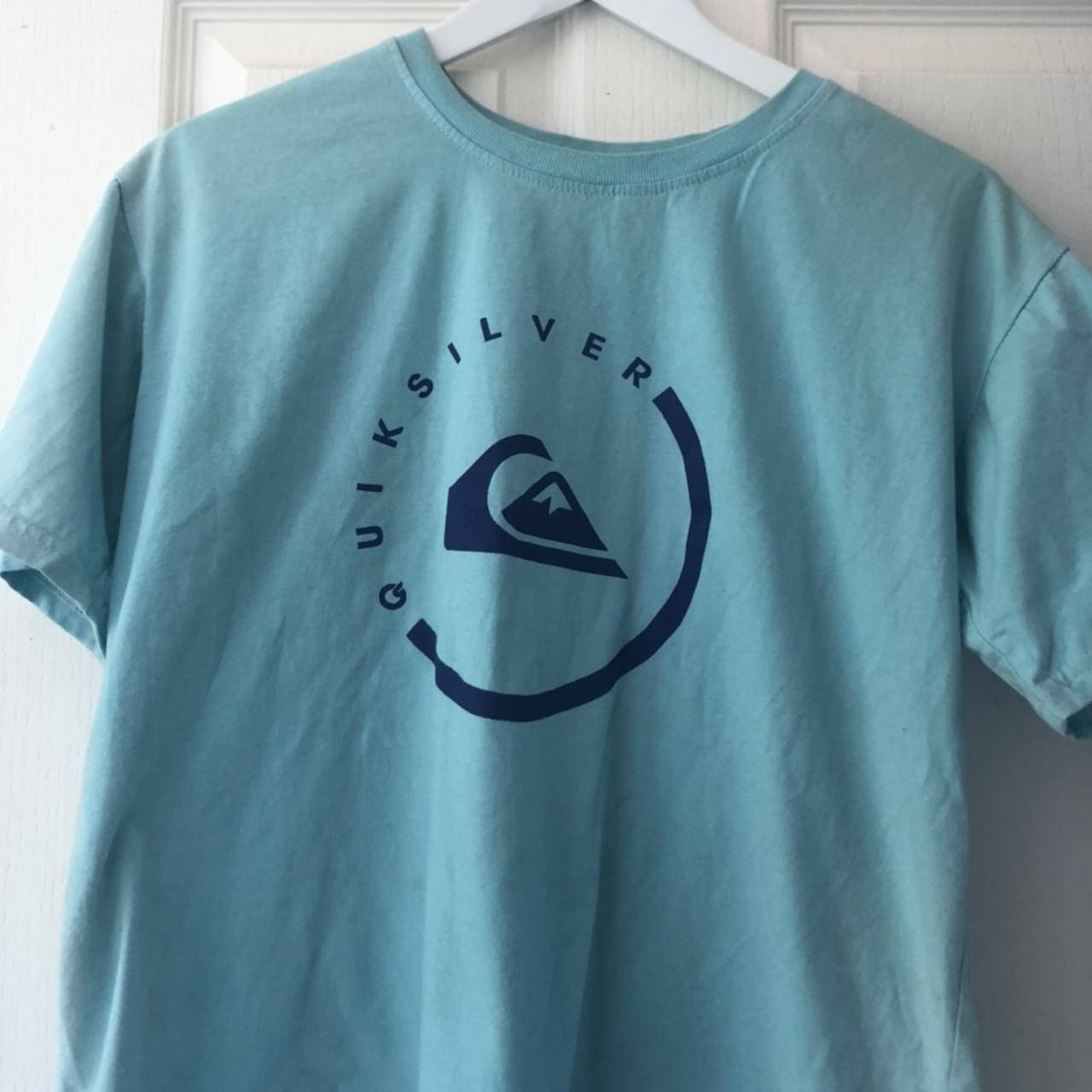 Blue Quiksilver top with contrast logo 100%... - Depop