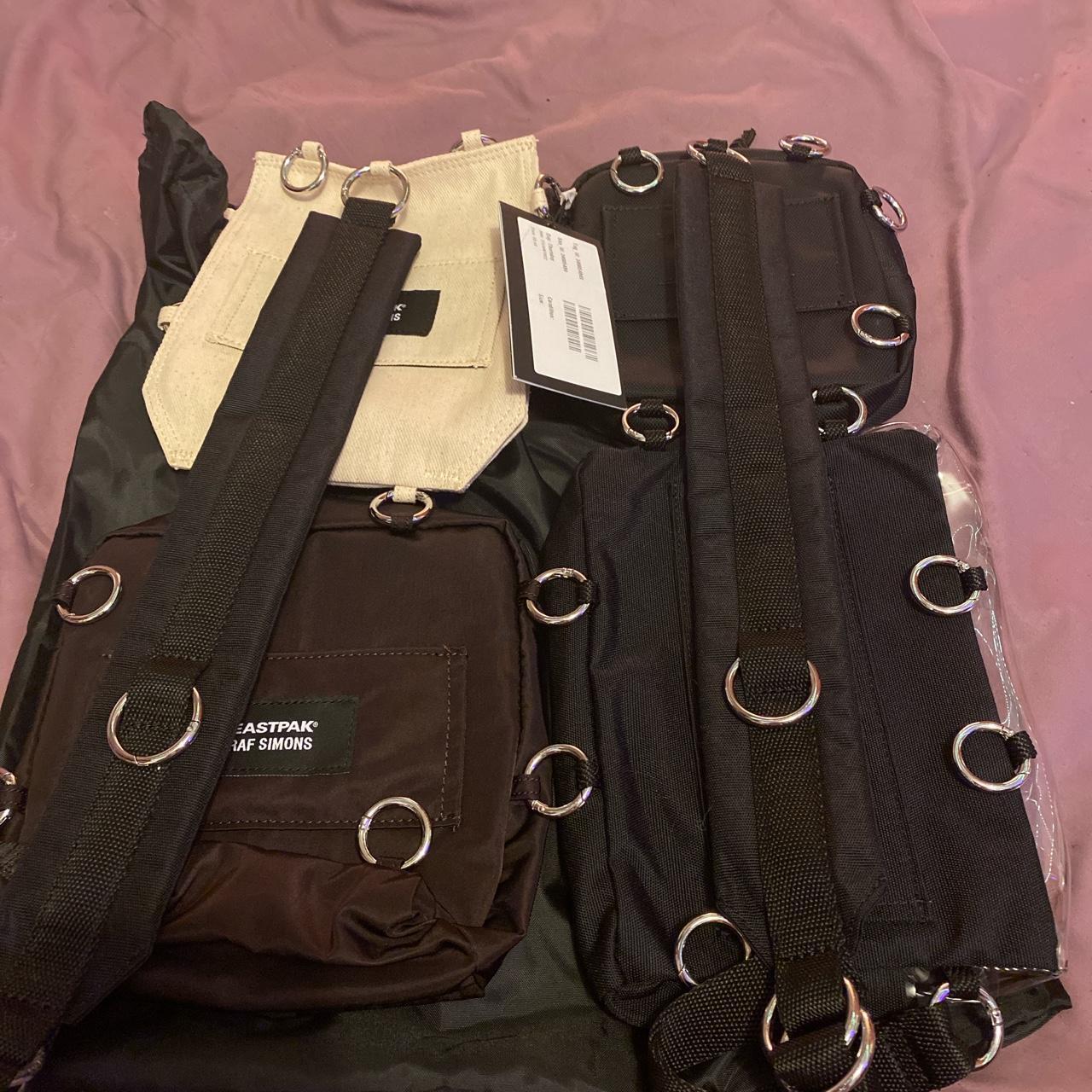 -Raf Simons x Eastpak Black and Cream Pocketbag Loop... - Depop