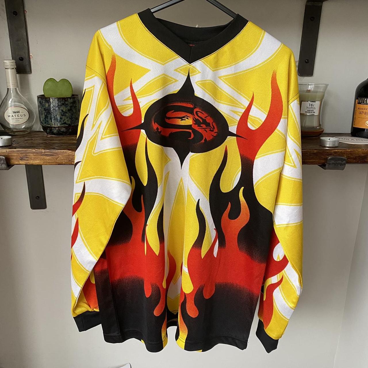 Flame design long sleeved V neck shirt. Label states... - Depop