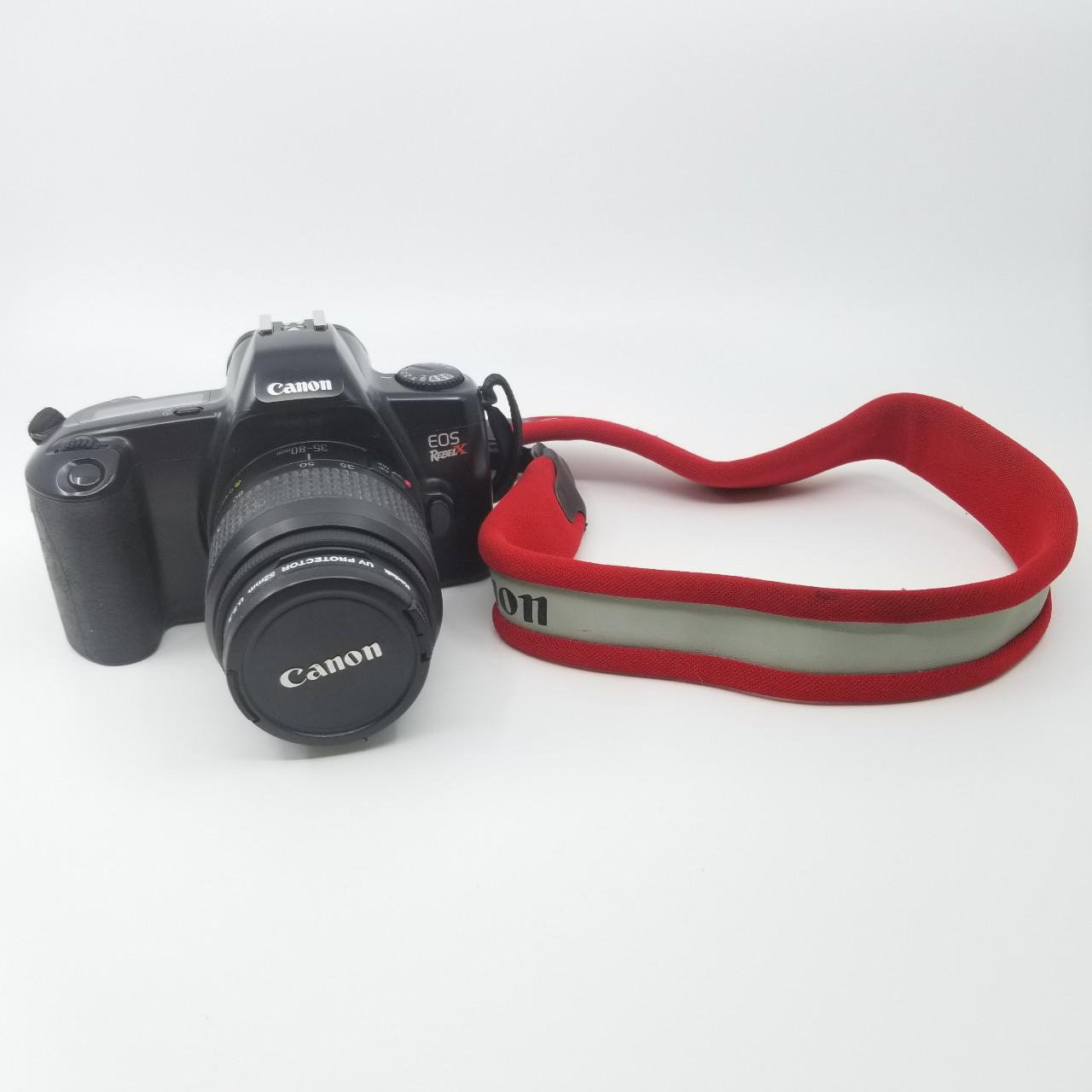 A vintage Canon EOS Rebel X 35mm film SLR camera.... - Depop