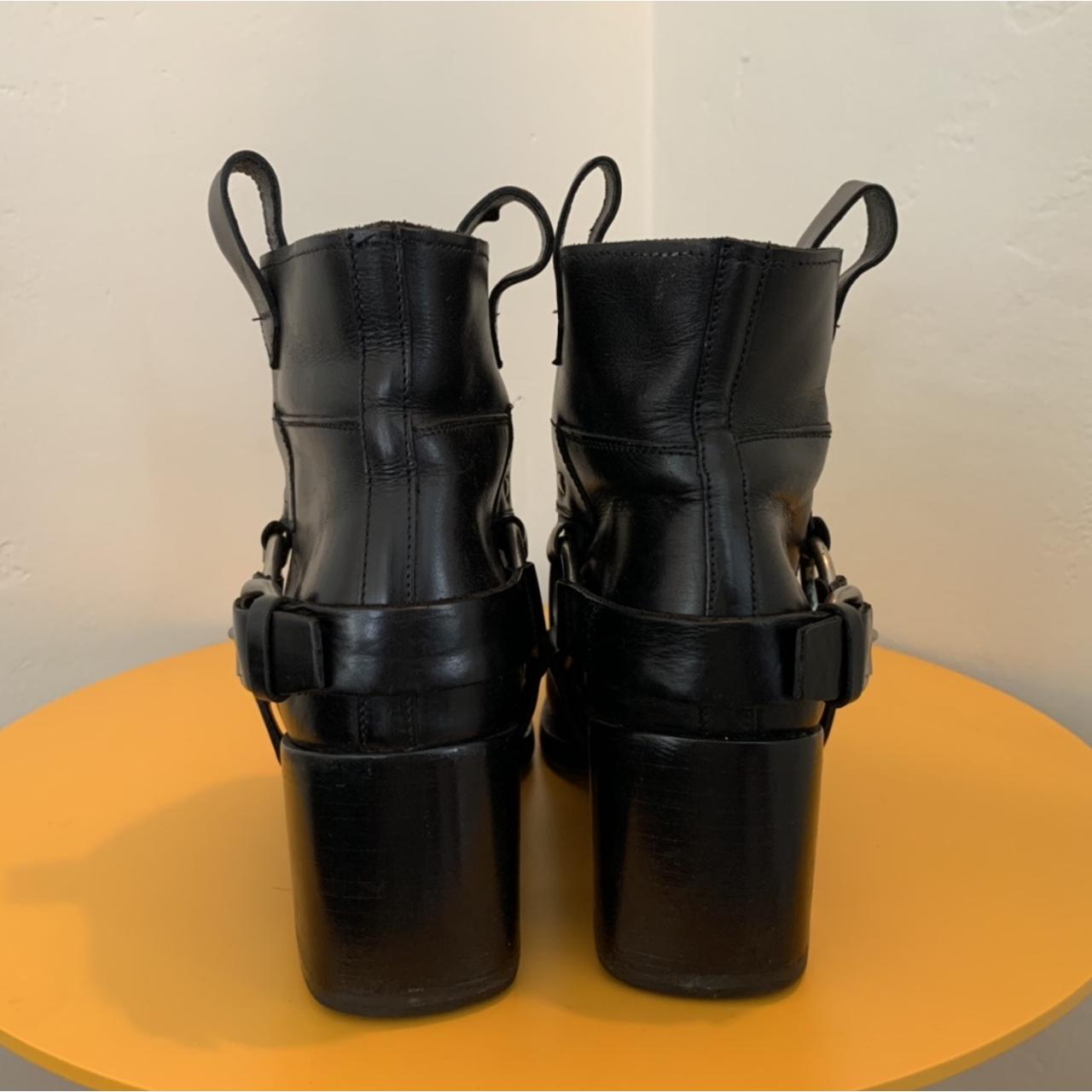 Miu Miu black leather motorcycle boots. Chic with... - Depop
