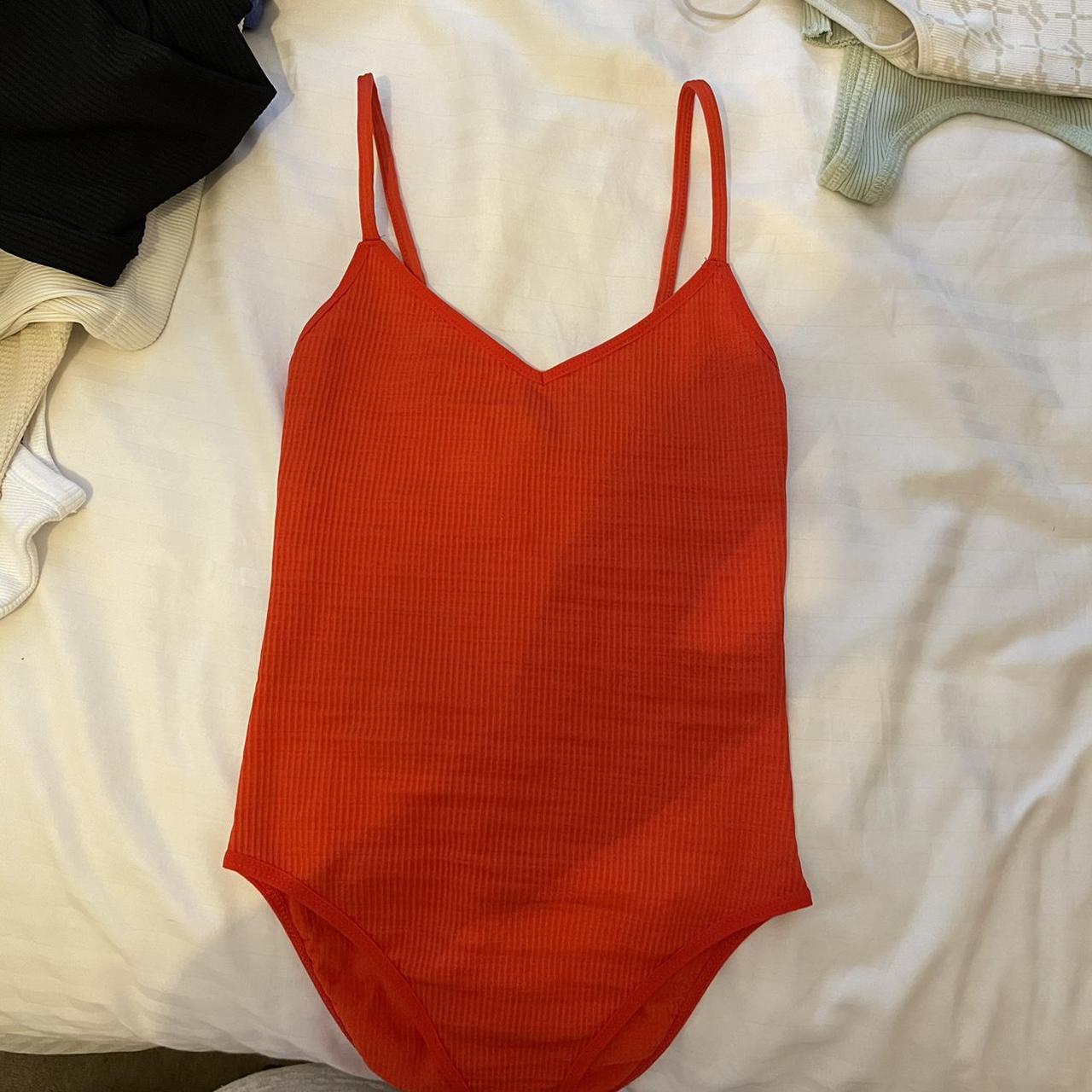Topshop red / orange ribbed bodysuit. Worn once - Depop