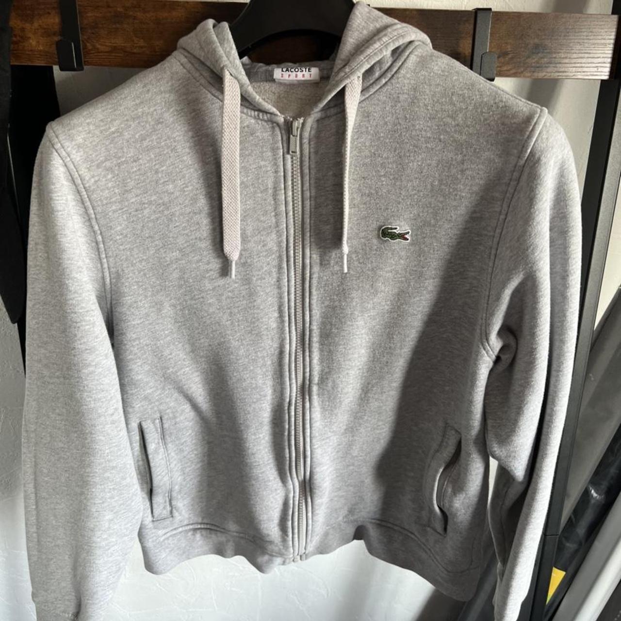 Lacoste grey zip hoodie Size MEDIUM, but runs a... - Depop
