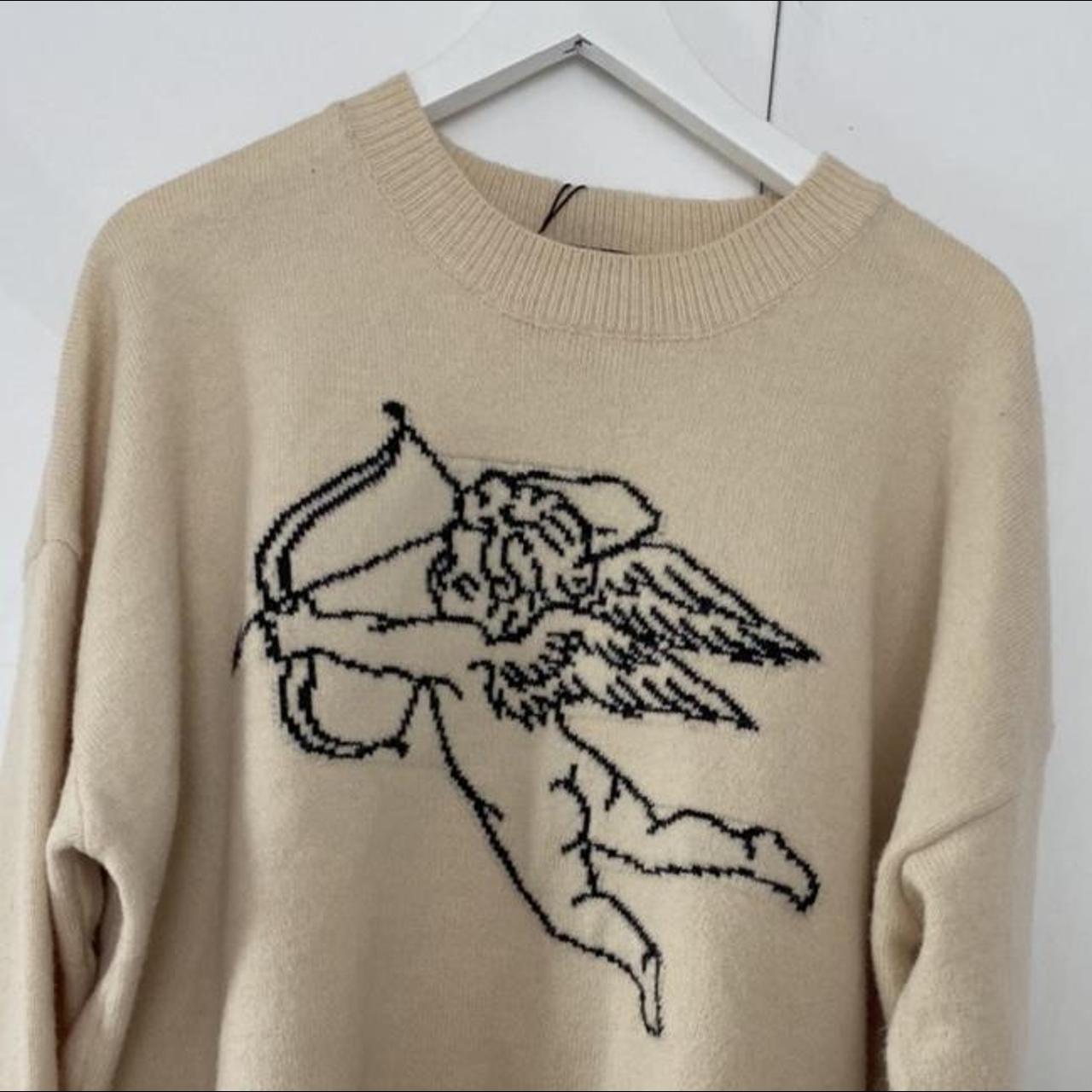 SELLING MOTEL ROCKS CUPID angel jumper, so cosy and... - Depop