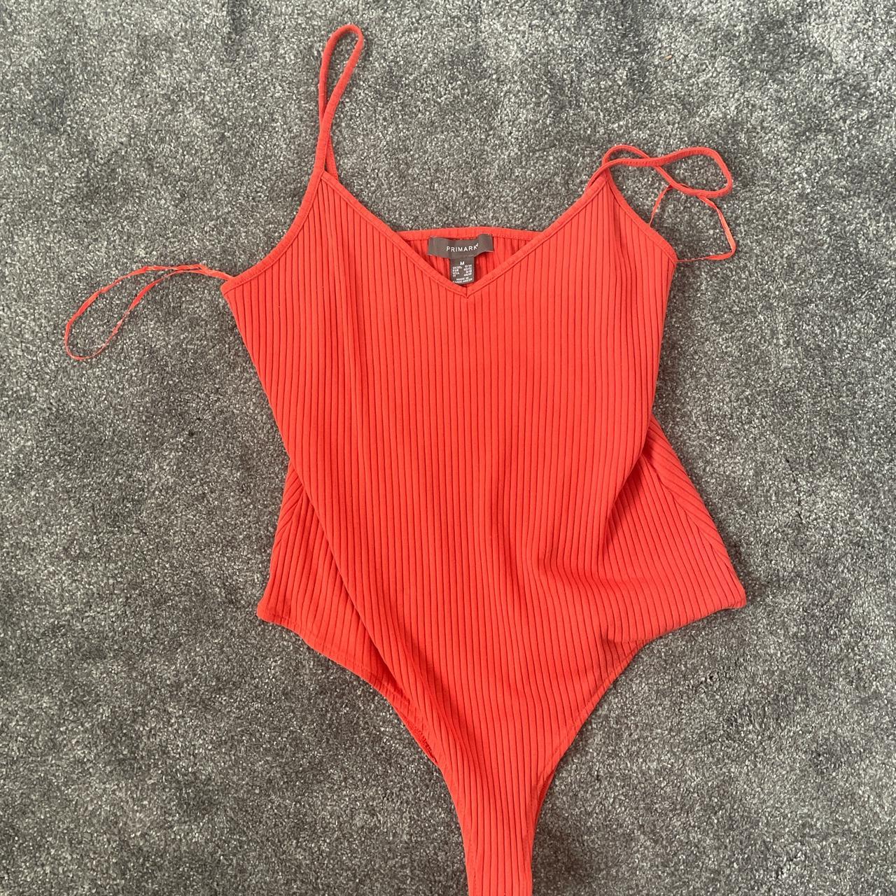 Primark orange ribbed bodysuit.... - Depop