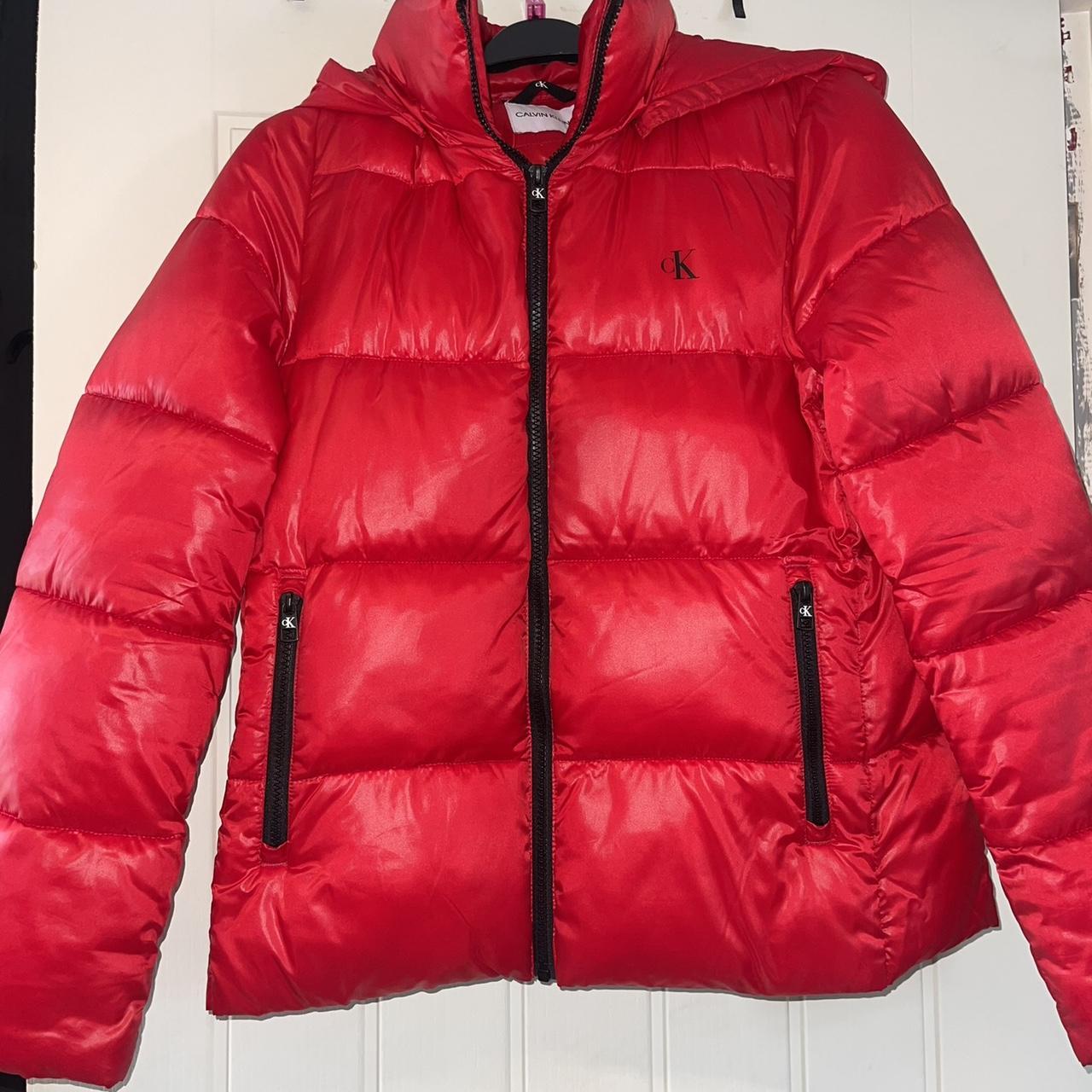 Calvin Klein red puffer coat size medium worn once.... - Depop