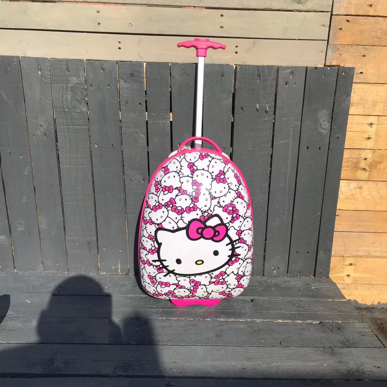 Pink Hello Kitty Suitcase good condition-the wheels... - Depop