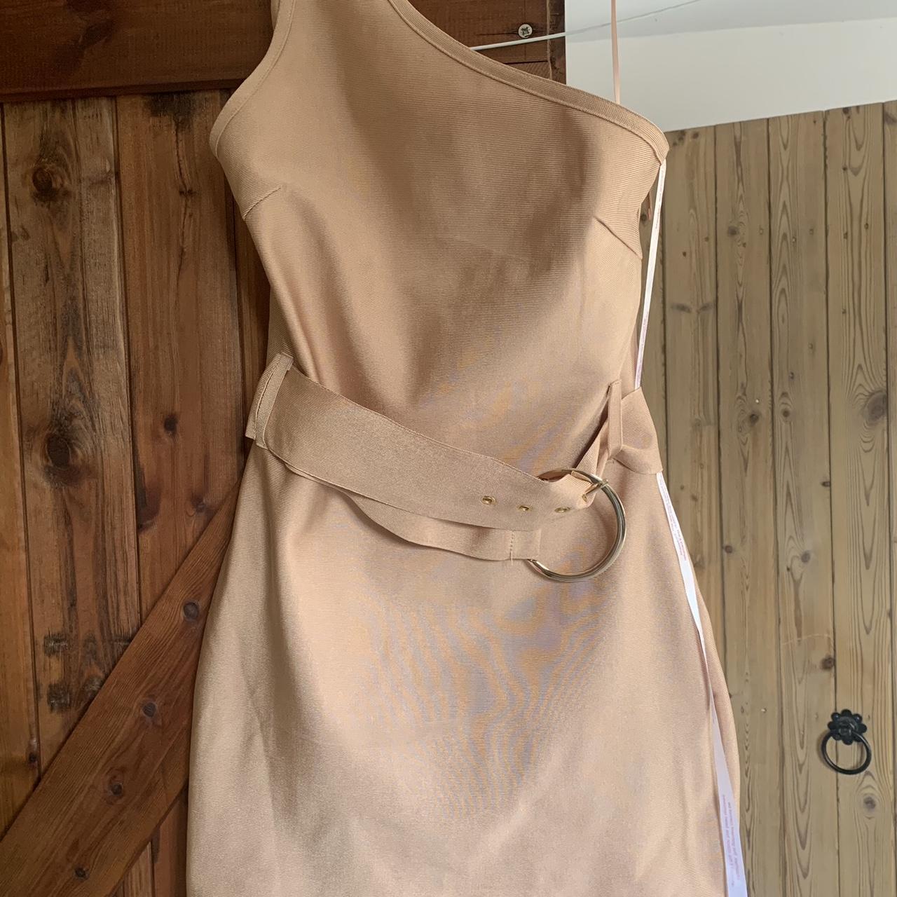 Gold tan bodycon mini dress. Never worn, with... - Depop
