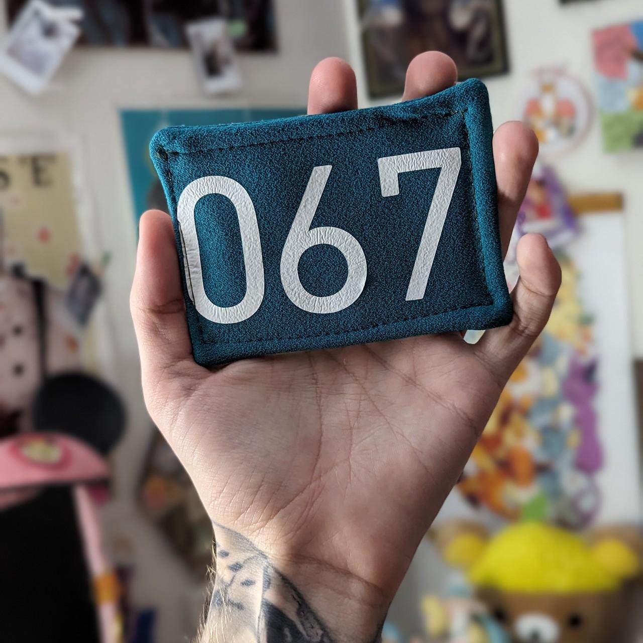 Kang Sae-byeok's number patch from Squid Game.... - Depop