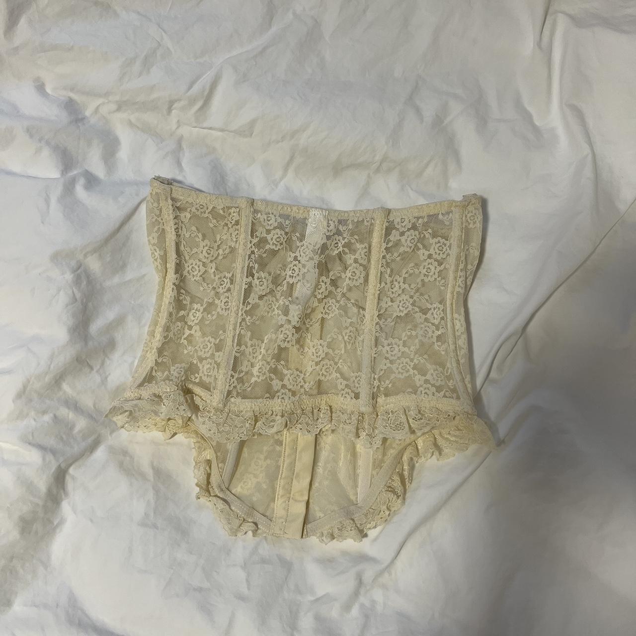cutest cream coloured lace corset from urban. - Depop