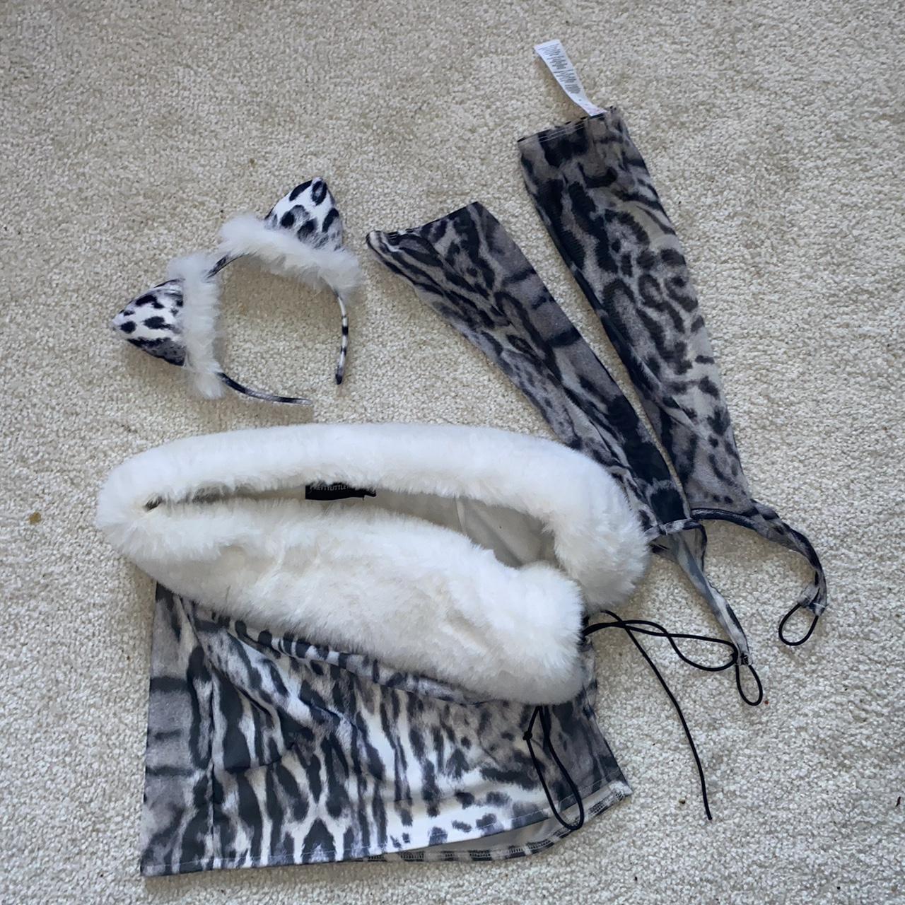 Snow leopard costume Only selling skirt, eats and... - Depop