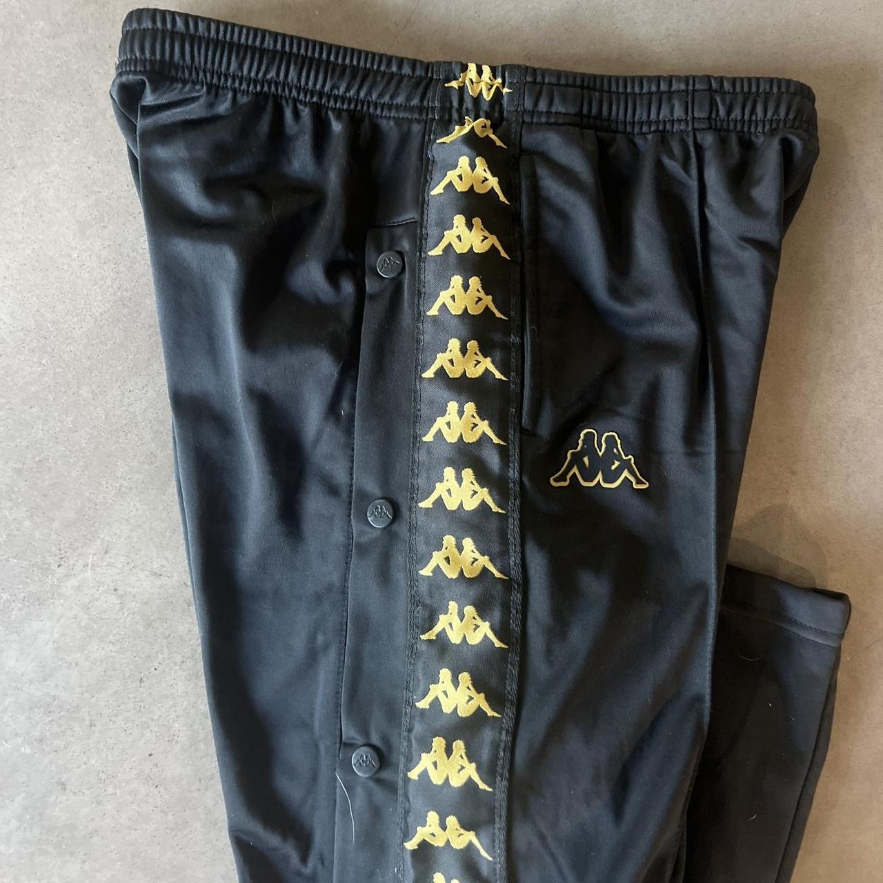 Black and gold Kappa track pants 👖 Buttons on each... - Depop