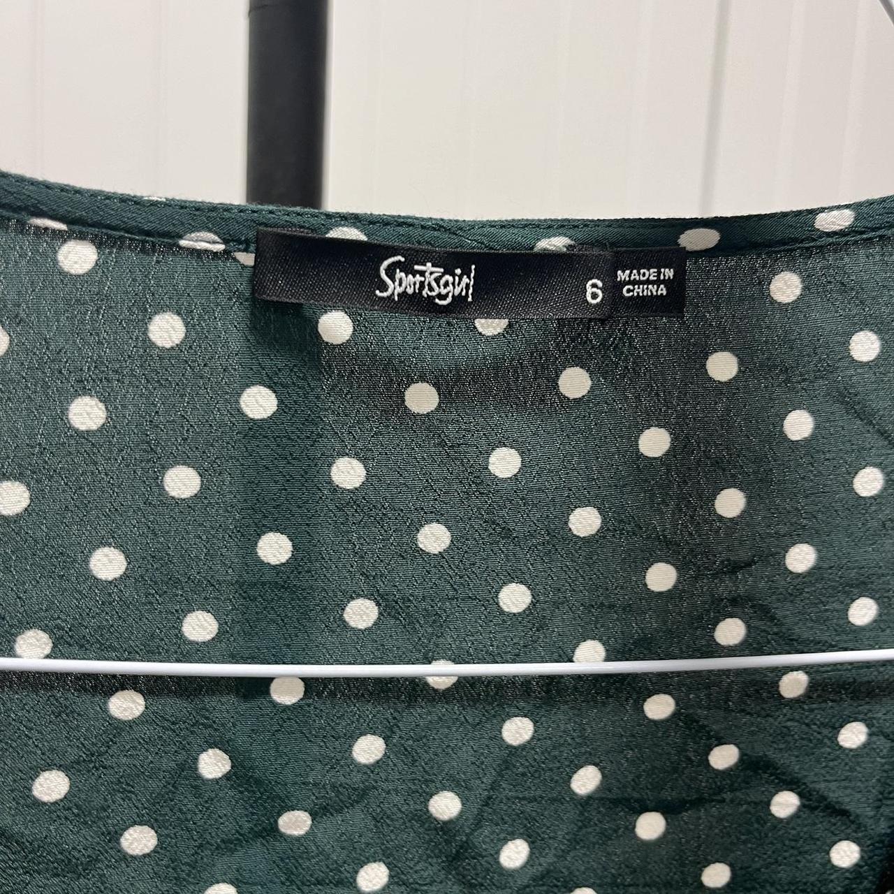 Sports girl spotty top Size 6 - Depop