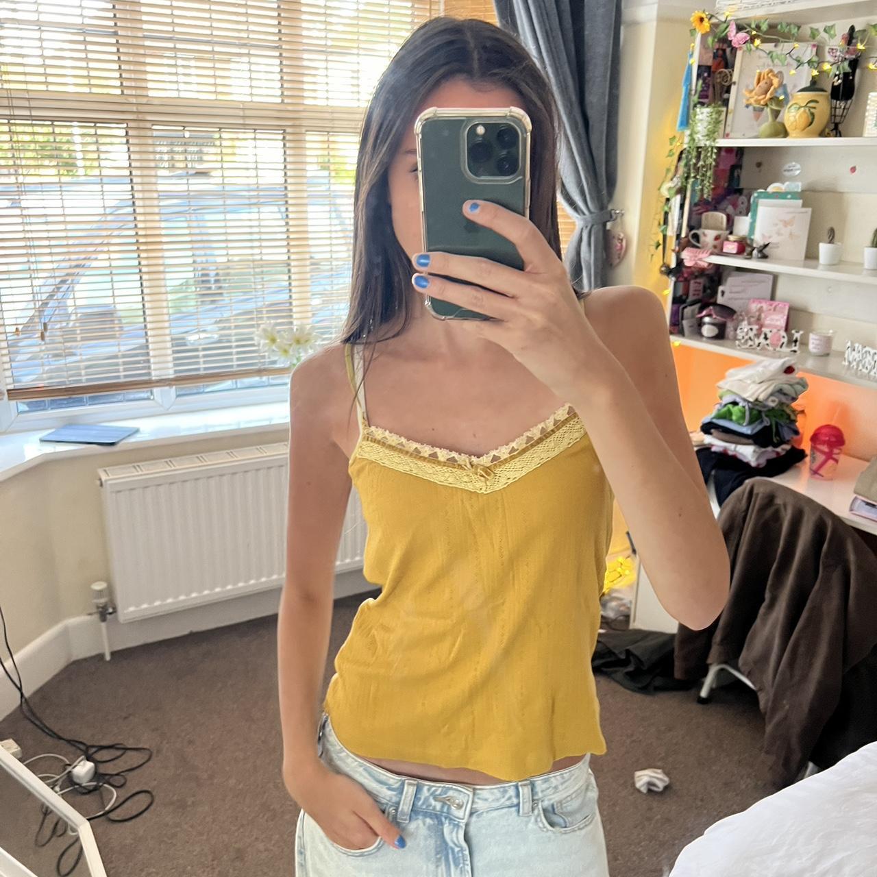 yellow vest top fits a size small/medium worn once... - Depop