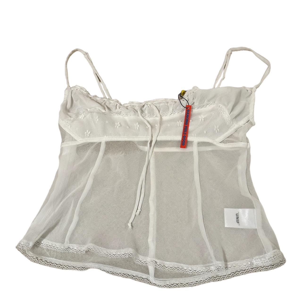 UNIF Angel top in size medium. FYI Back seam is... - Depop