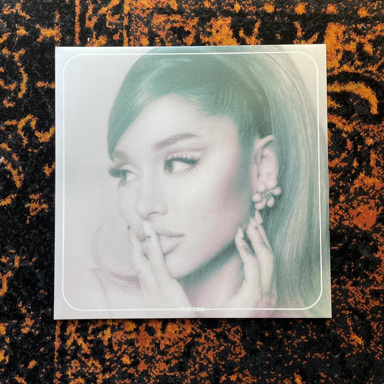 ariana grande positions target exclusive flow in the... - Depop