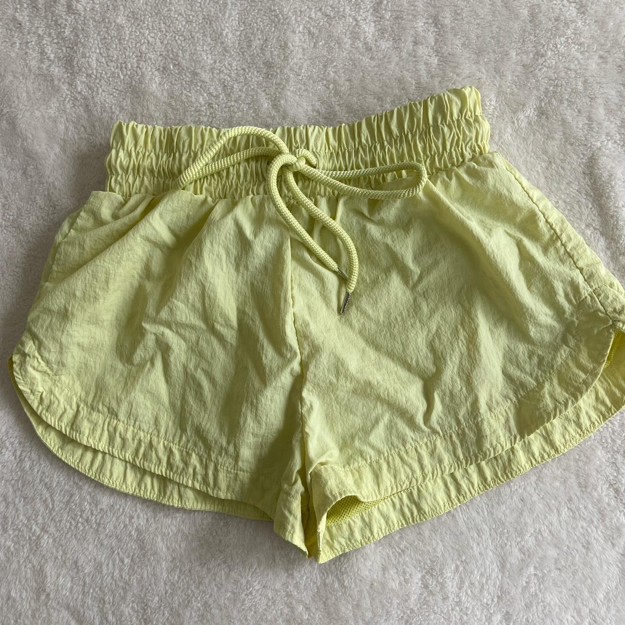 Yellow workout shorts from Forever21 Best fits an XS... - Depop